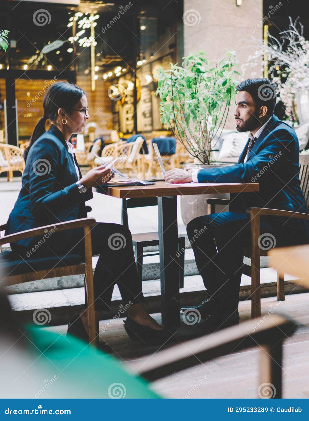 Business People Chatting with Each Other in Cafe Stock Image - Image of ...