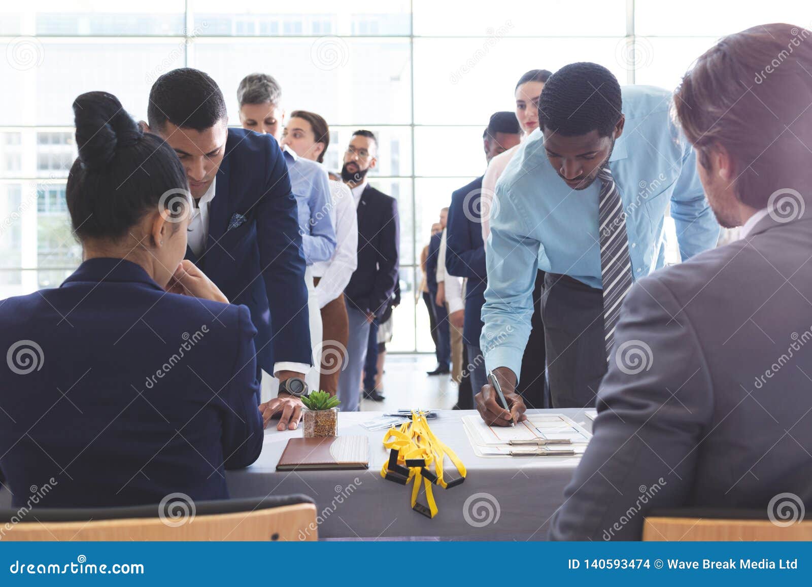 Business People Checking in at Conference Registration Table Stock ...