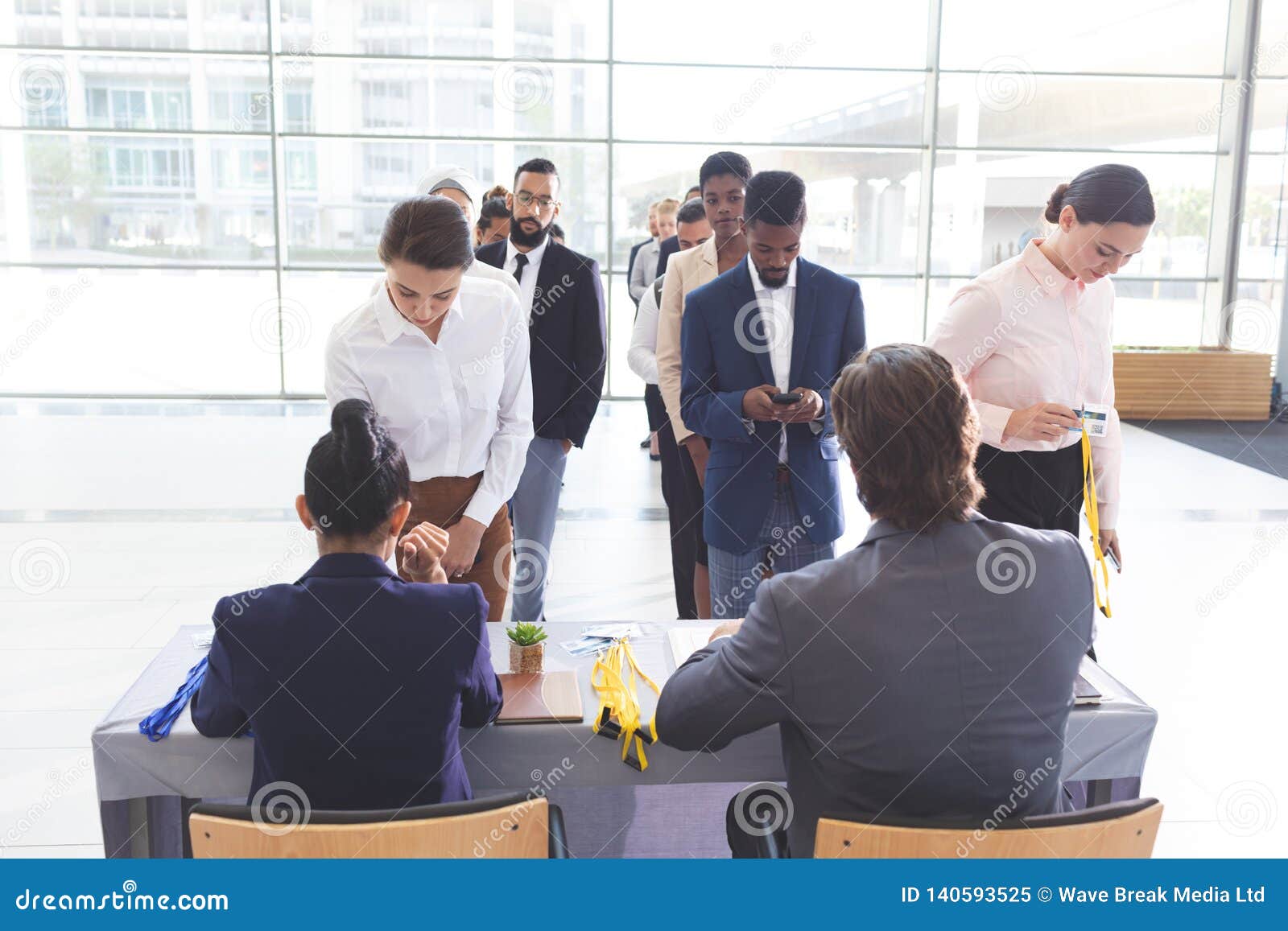 Business People Checking in at Conference Registration Table Stock ...