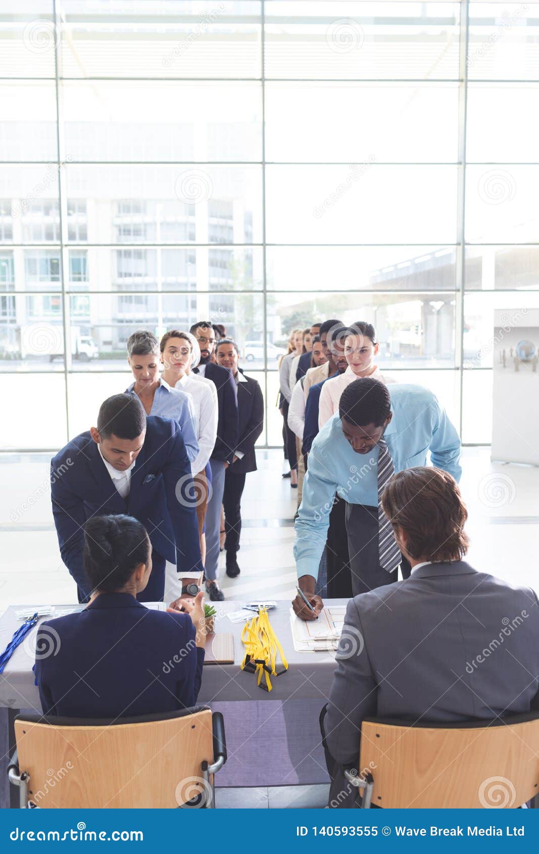 Business People Checking in at Conference Registration Table Stock ...