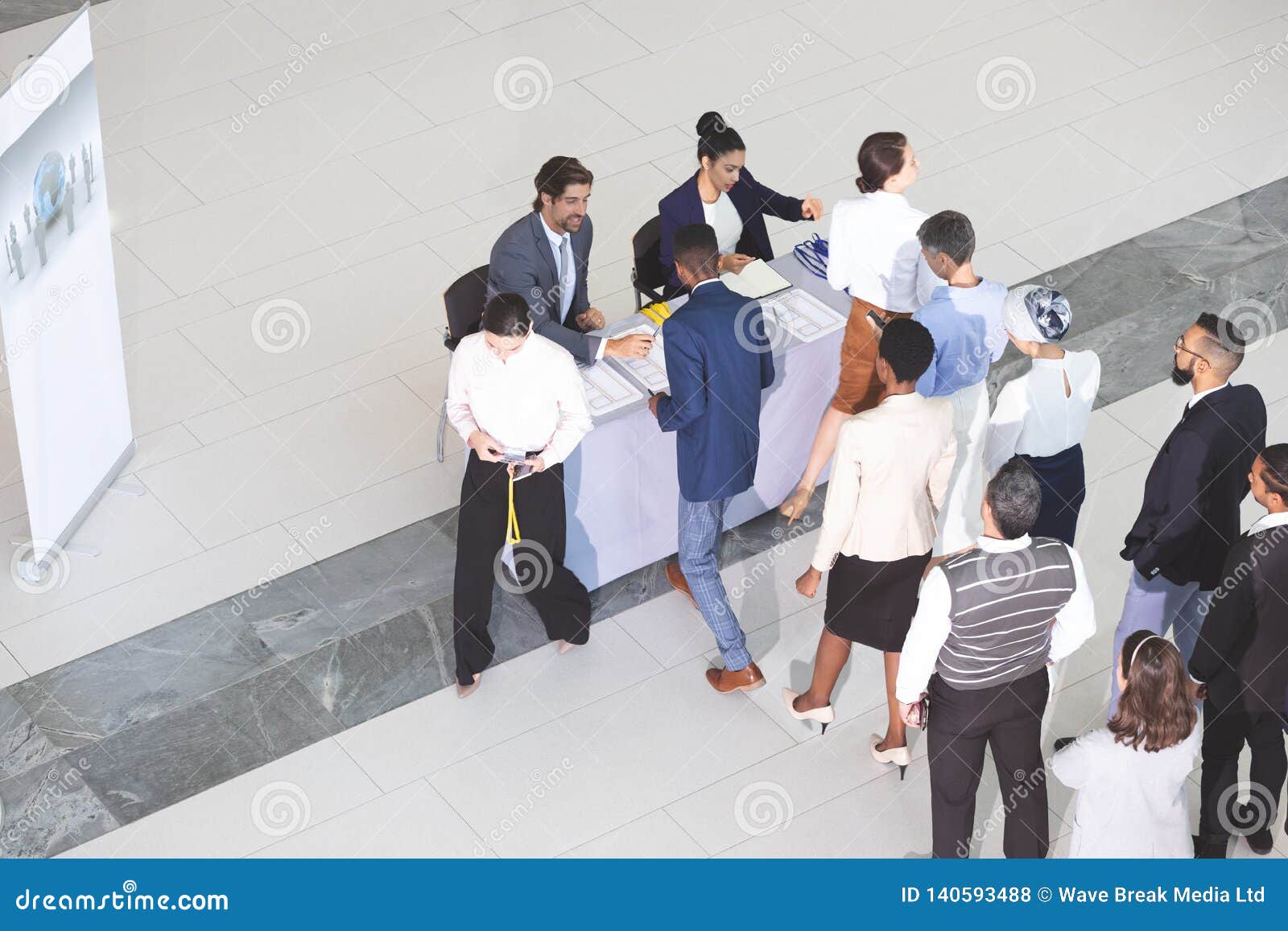Business People Checking in at Conference Registration Table Stock ...