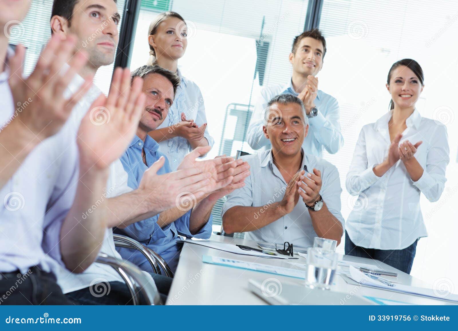 Business People Clapping in a Meeting Stock Photo - Image of ...
