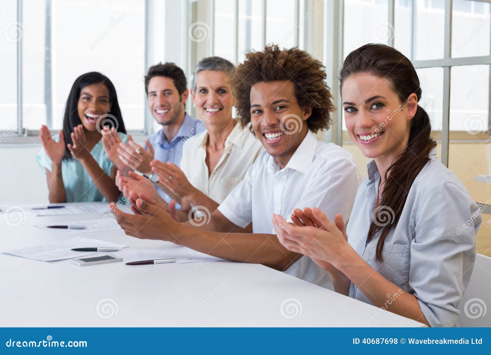 Business People Clapping and Smiling at Camera Stock Photo - Image of ...
