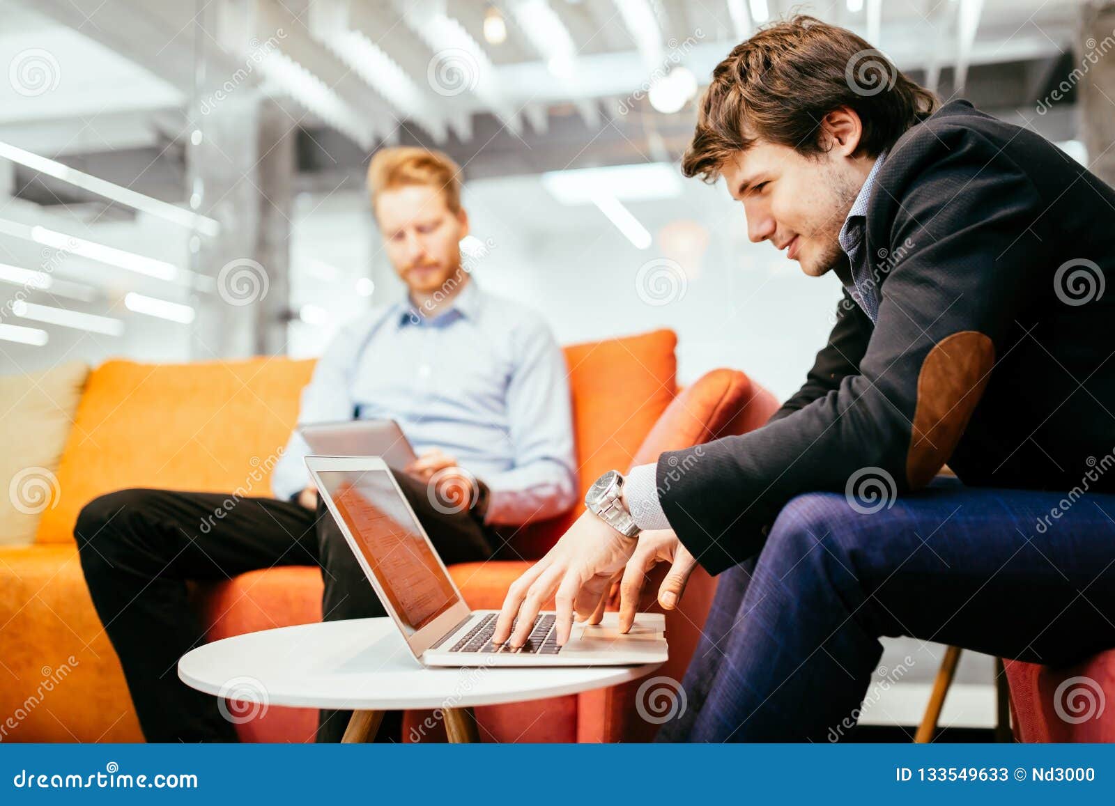 Business People Collaborating in Office and Working on Project Together ...