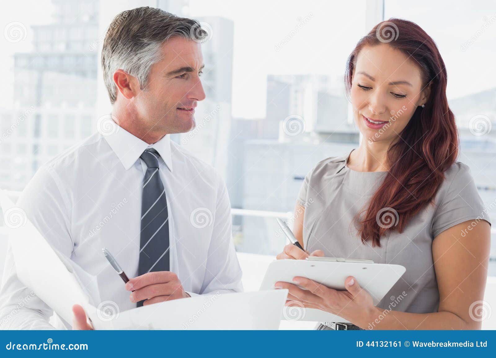 Business People Comparing Work Notes Stock Image - Image of staff ...