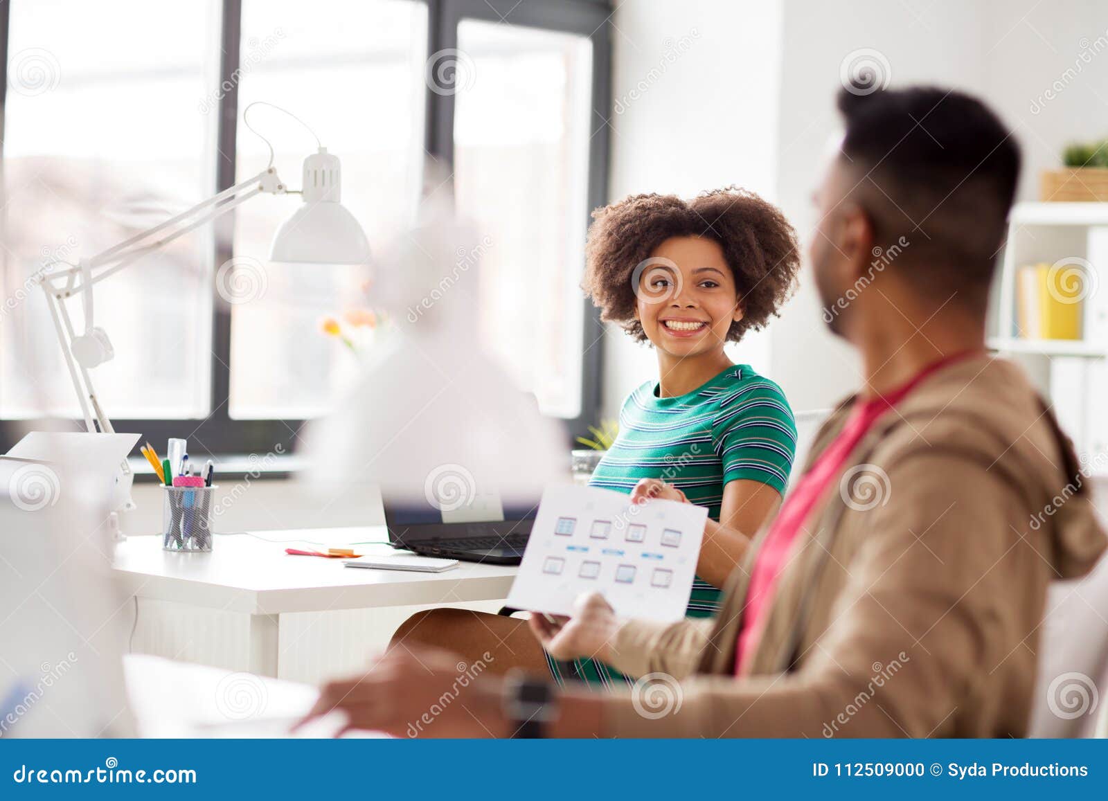 Happy Creative Workers with Laptops at Office Stock Photo - Image of ...