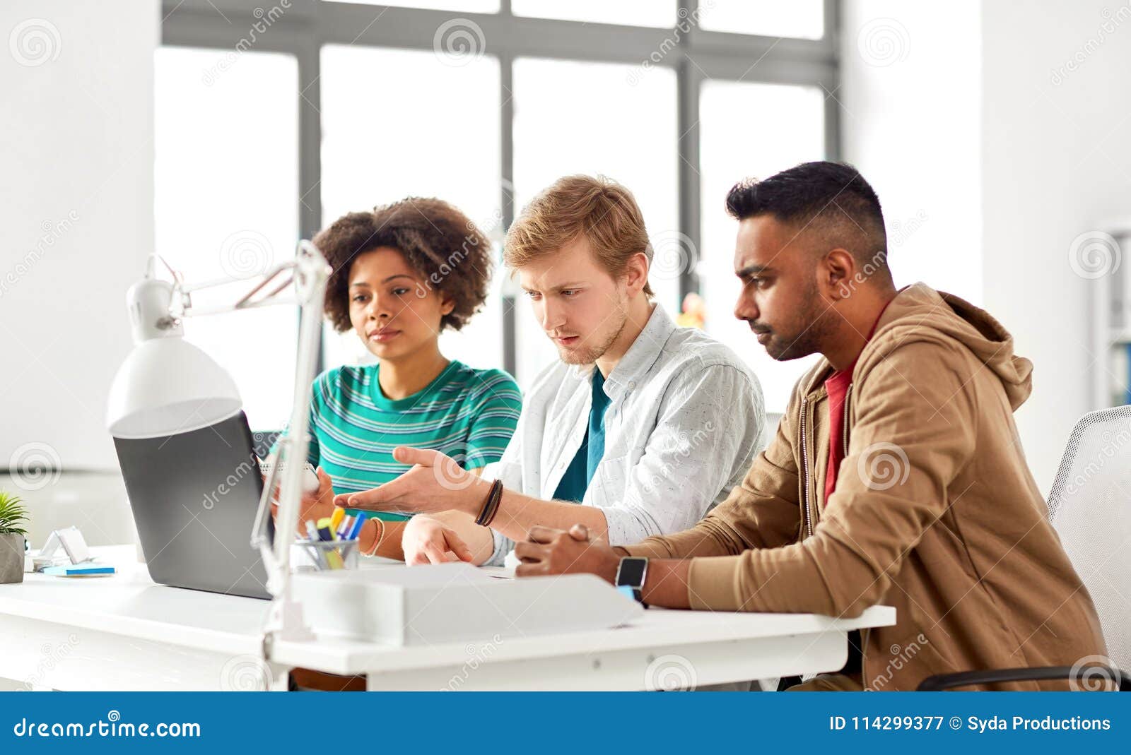 Happy Creative Workers with Laptops at Office Stock Image - Image of ...