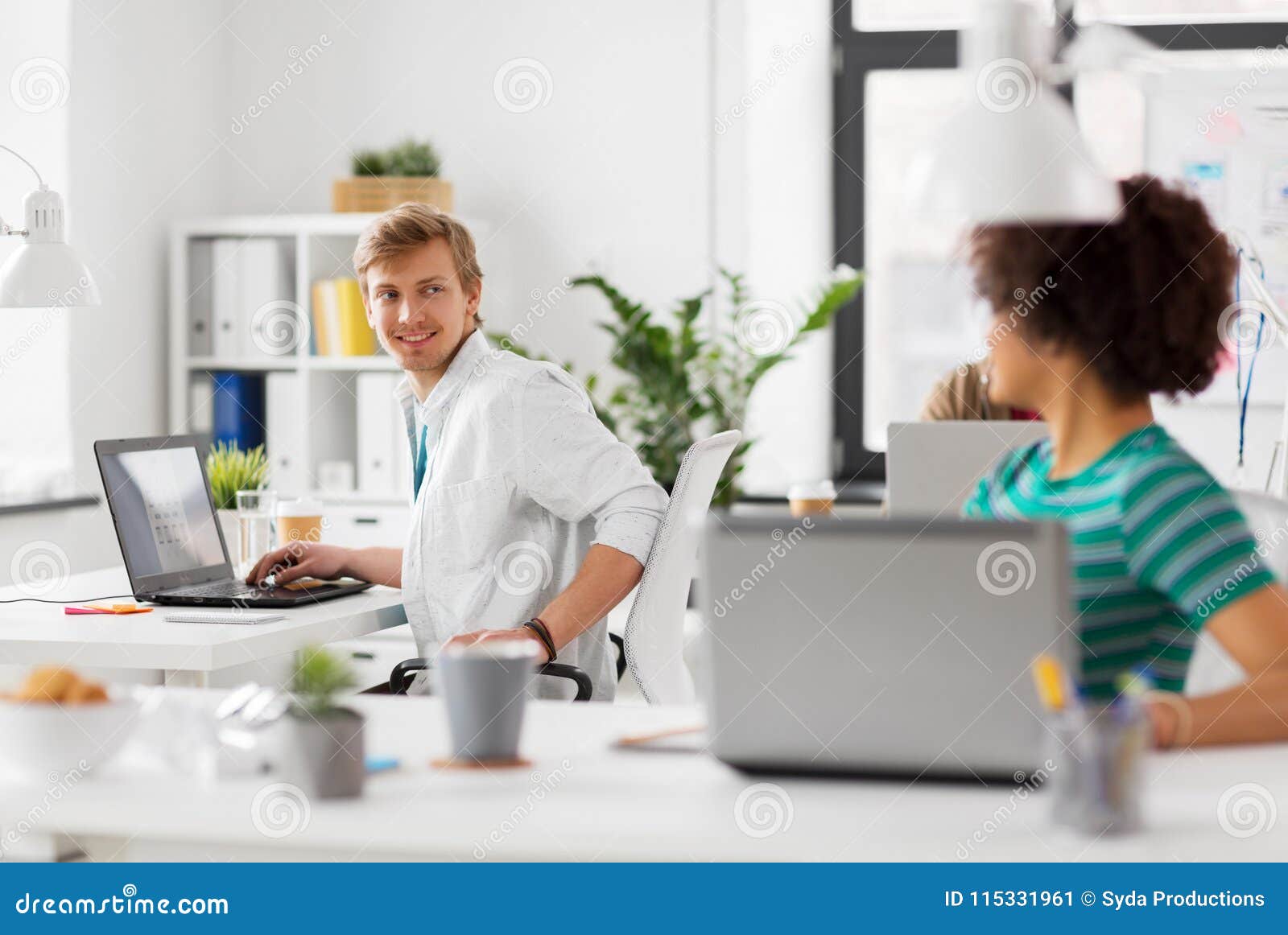Happy Creative Workers with Laptops at Office Stock Image - Image of ...
