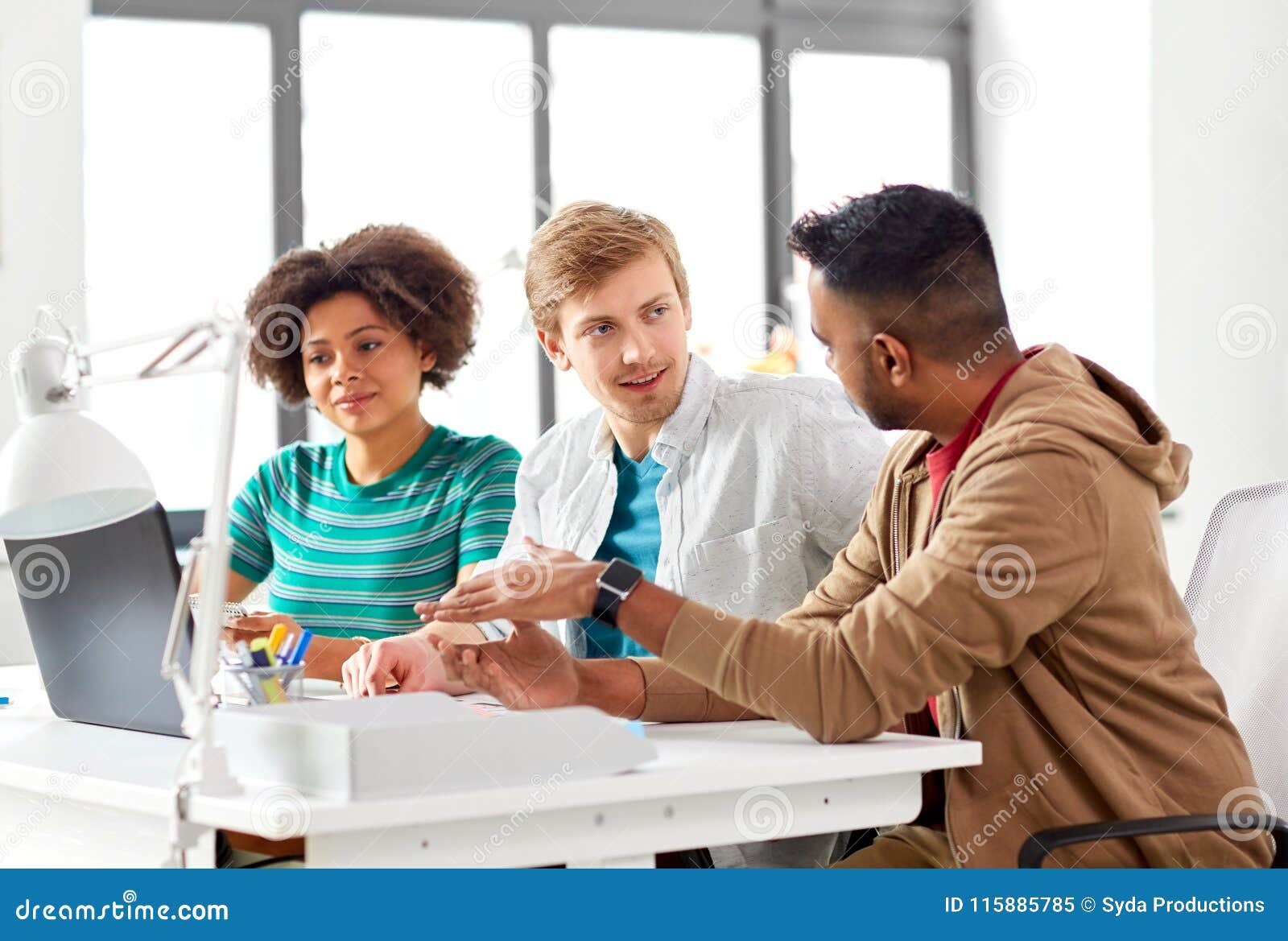 Happy Creative Workers with Laptops at Office Stock Image - Image of ...