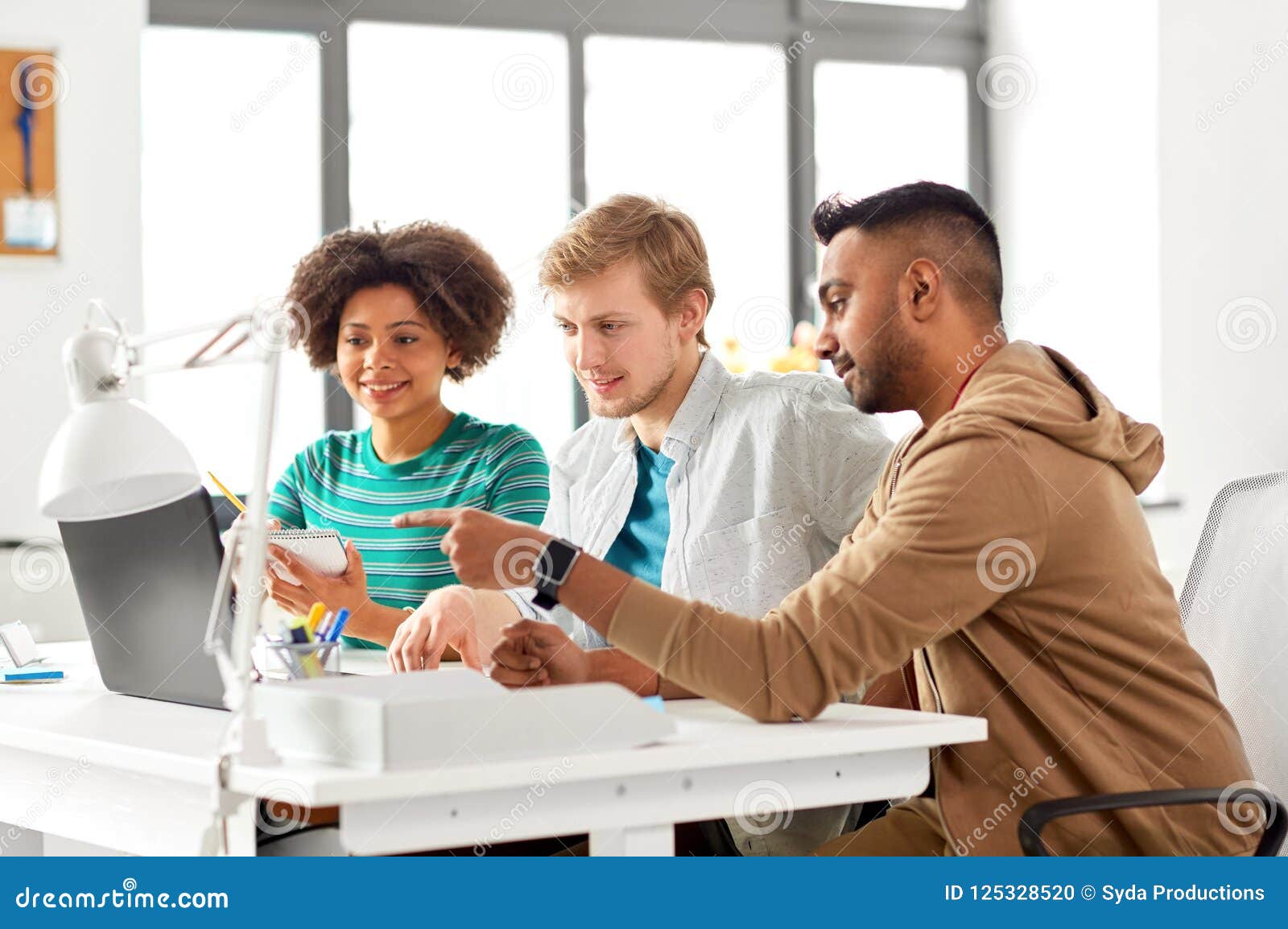 Happy Creative Workers with Laptops at Office Stock Photo - Image of ...