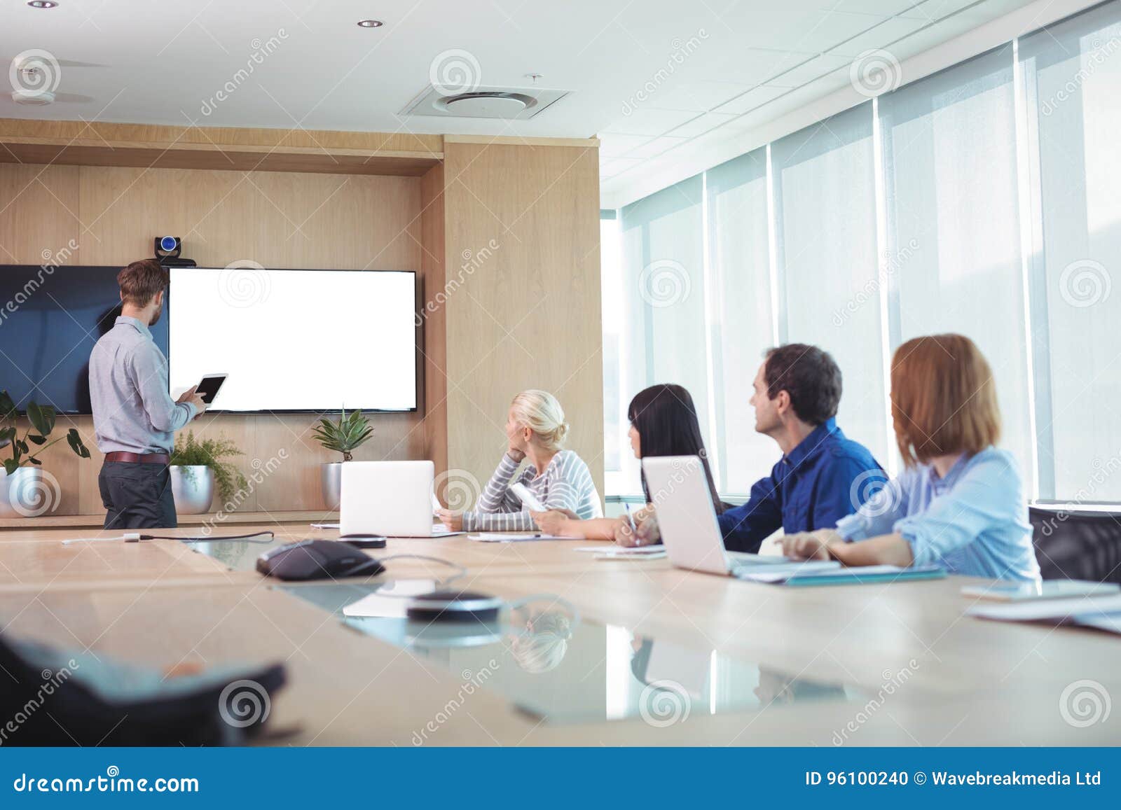 Business People at Conference Table in Office Stock Photo - Image of ...