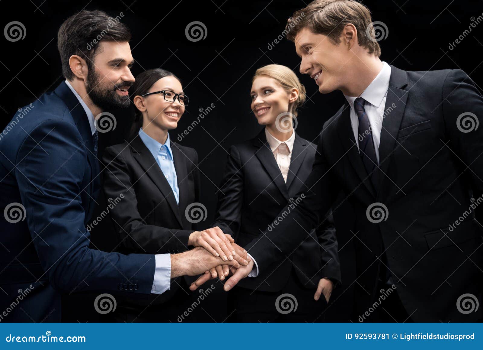 Business People Connecting and Stacking Hands and Smiling Isolated on ...