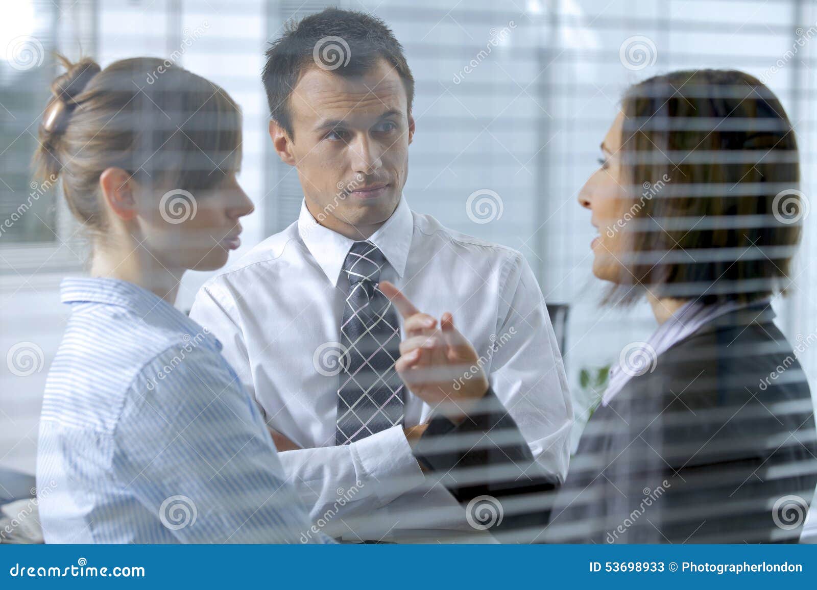 Business People Conversing in Office Stock Image - Image of head ...