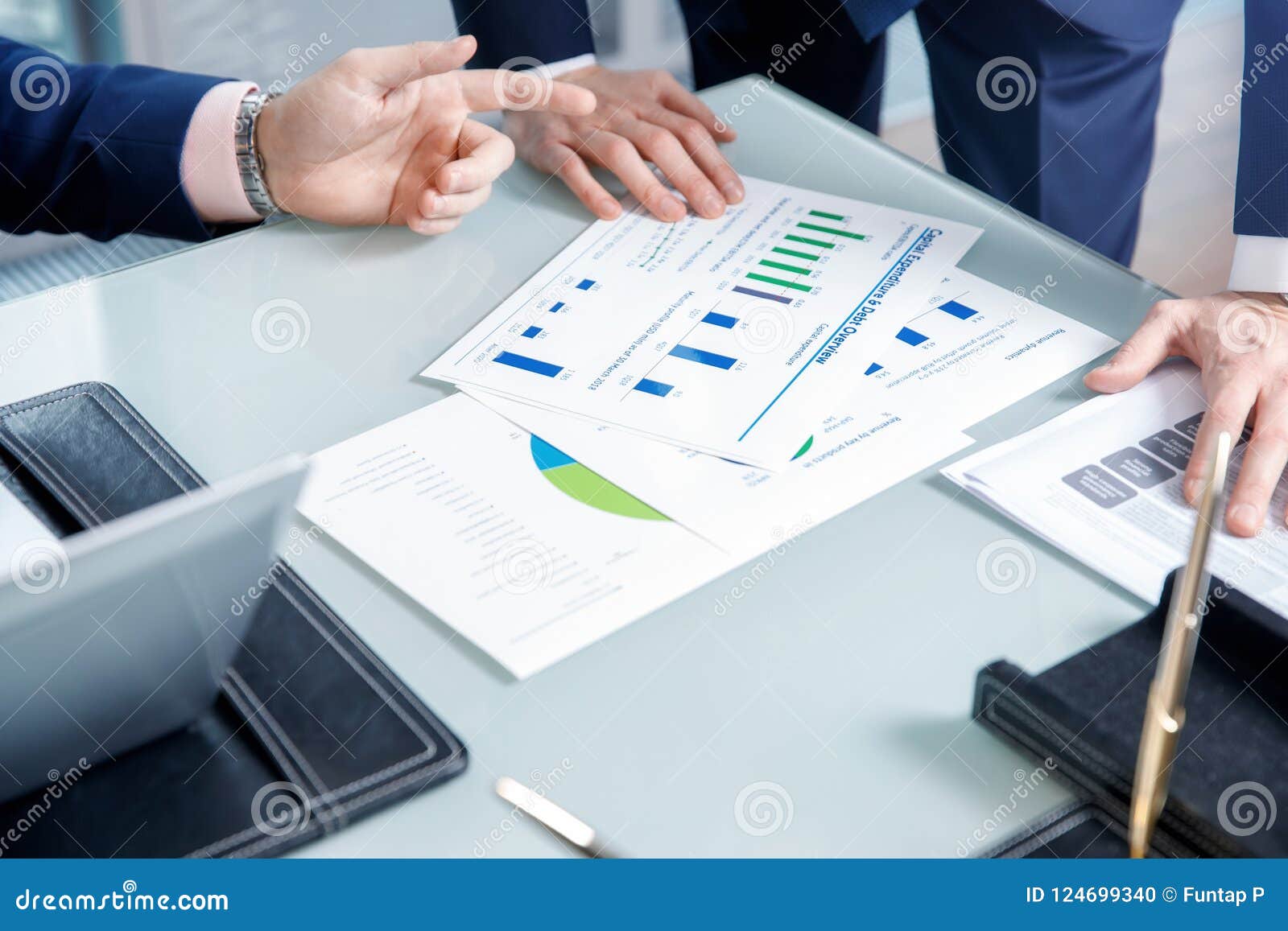 Business People Discuss Financial Statements. Stock Photo - Image of ...