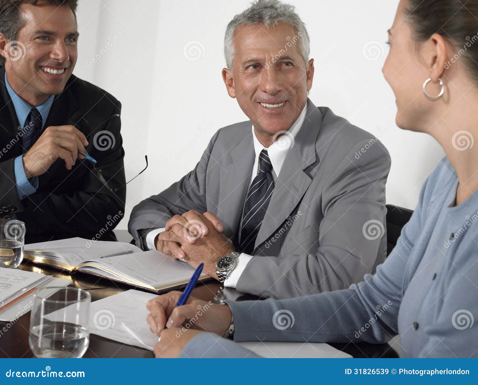 Business People Discussing at Conference Table Stock Image - Image of ...