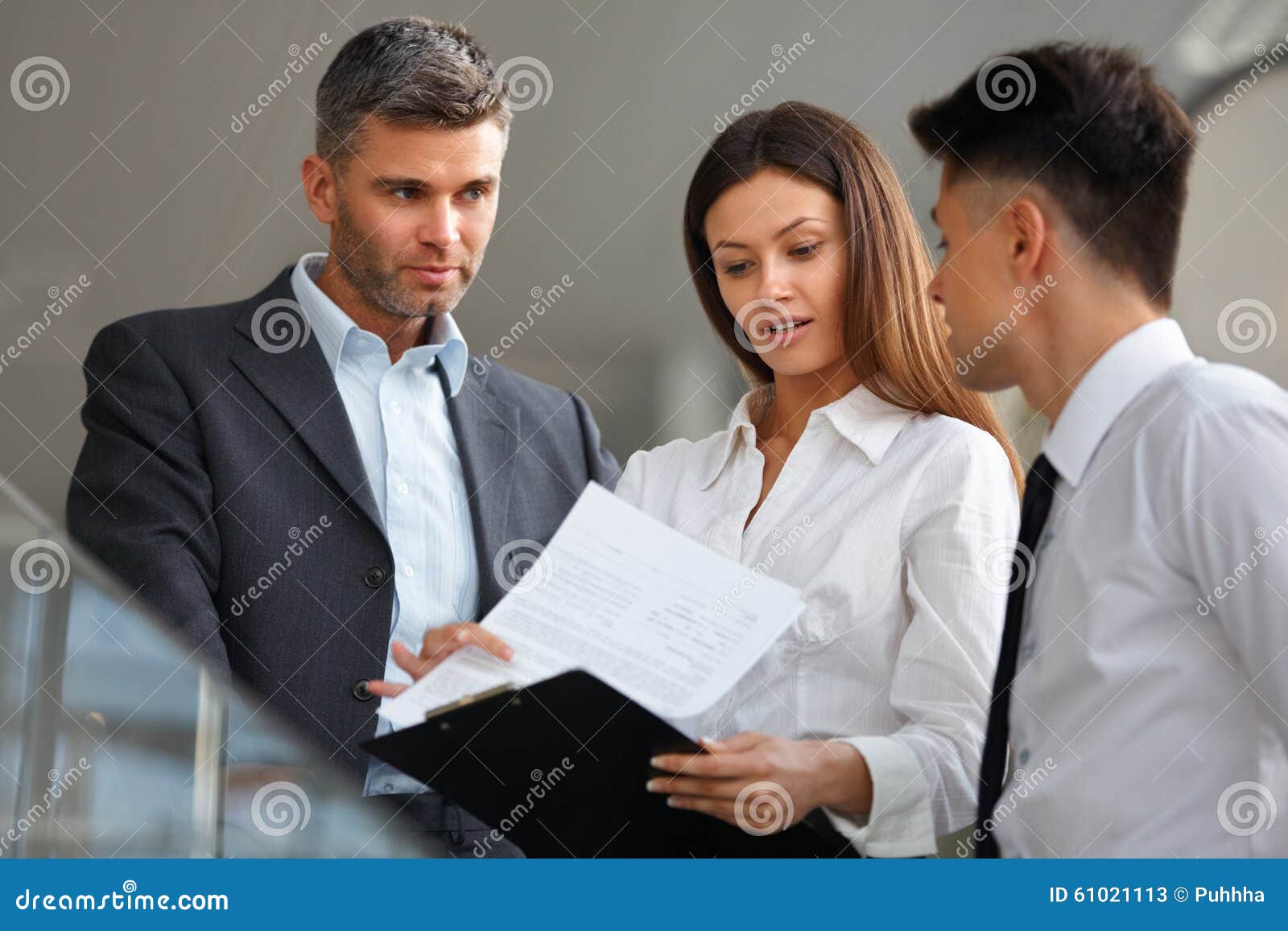 Business People Discussing Documents and Ideas. Business Team Stock ...