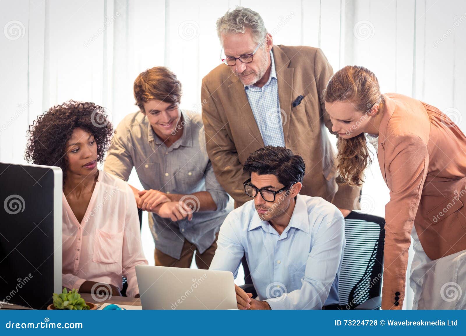 Business People Discussing Over Laptop Stock Photo - Image of adult ...
