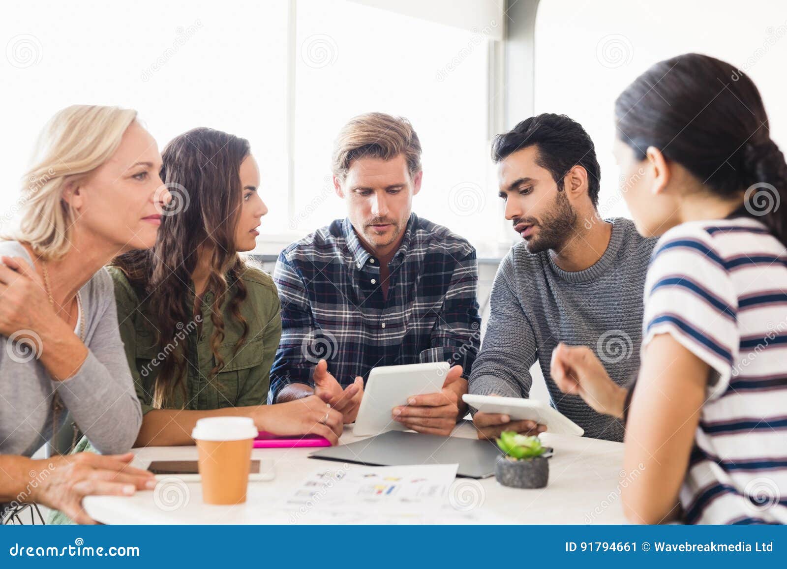 Business People Discussing Over Tablet Computer Stock Image - Image of ...