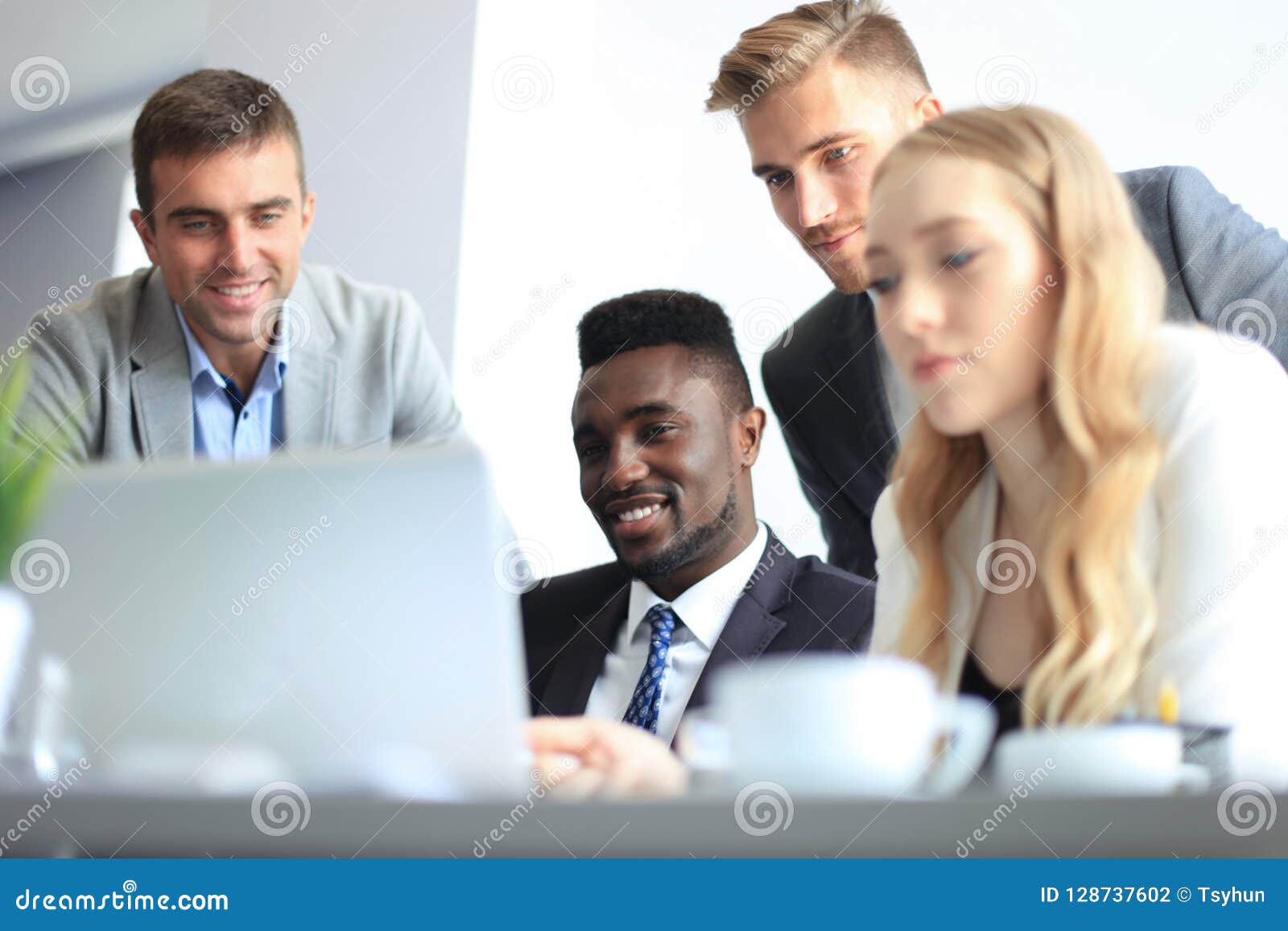 Business People in Discussing Something while Sitting Together at the ...