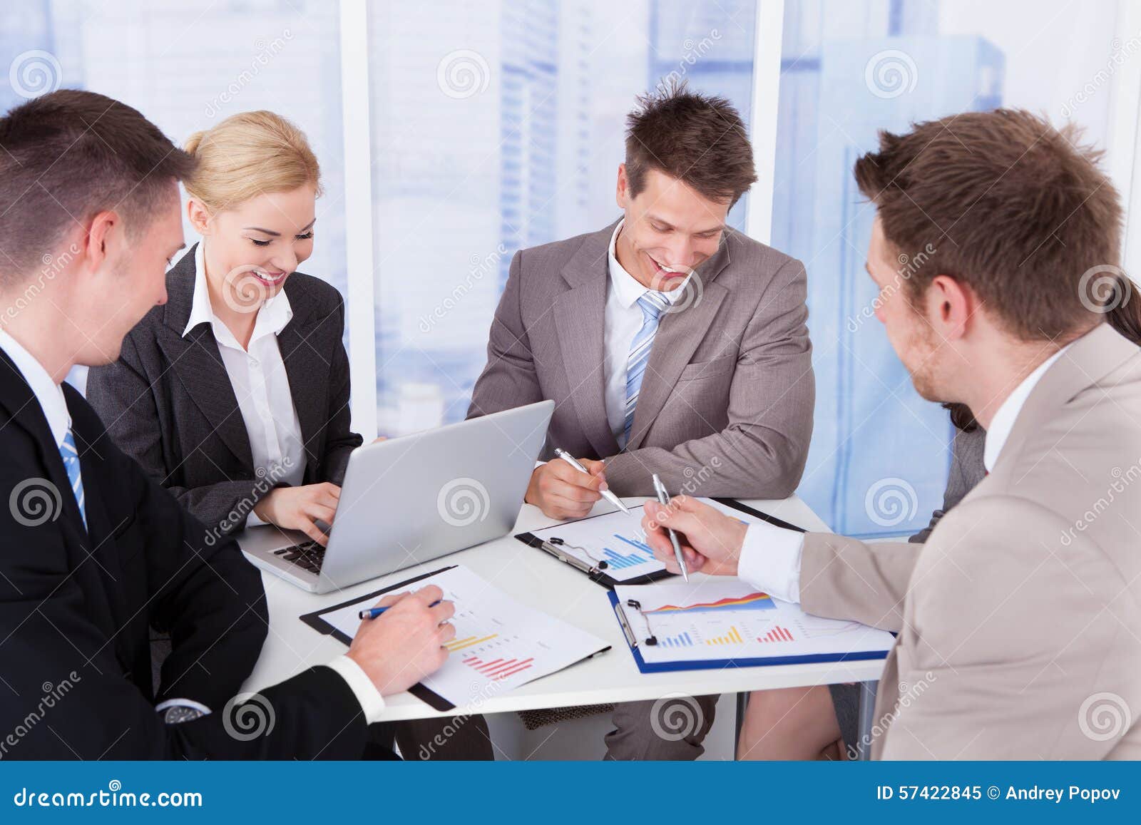 Business People Discussing at Table in Office Stock Image - Image of ...