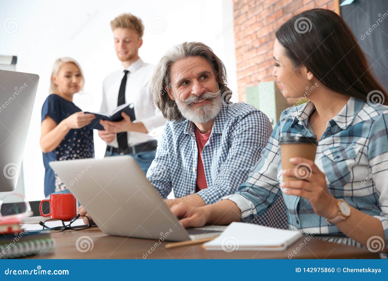 Business People Discussing Work Matters in Office Stock Photo - Image ...