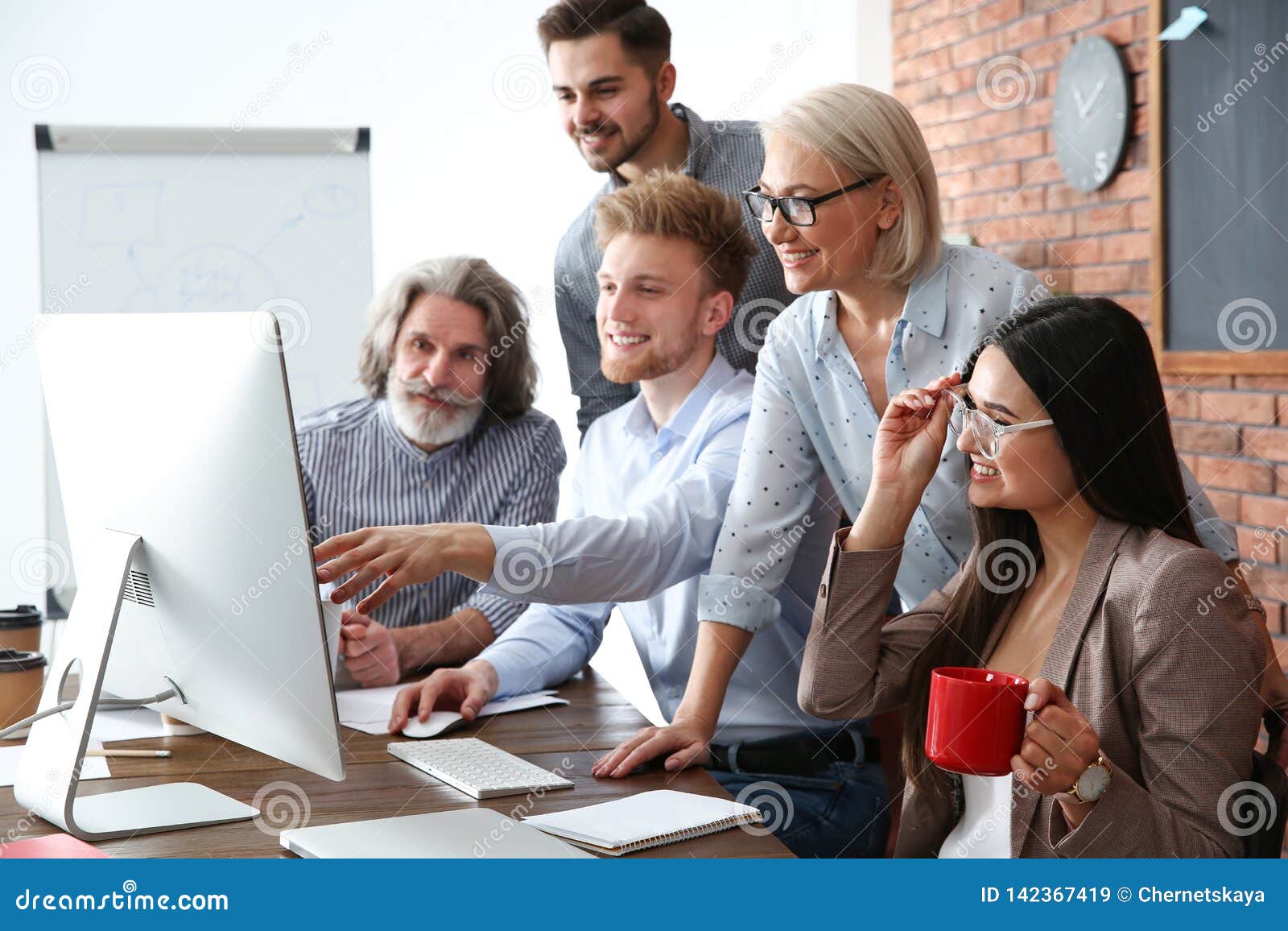 Business People Discussing Work Matters at Table in Office Stock Image ...