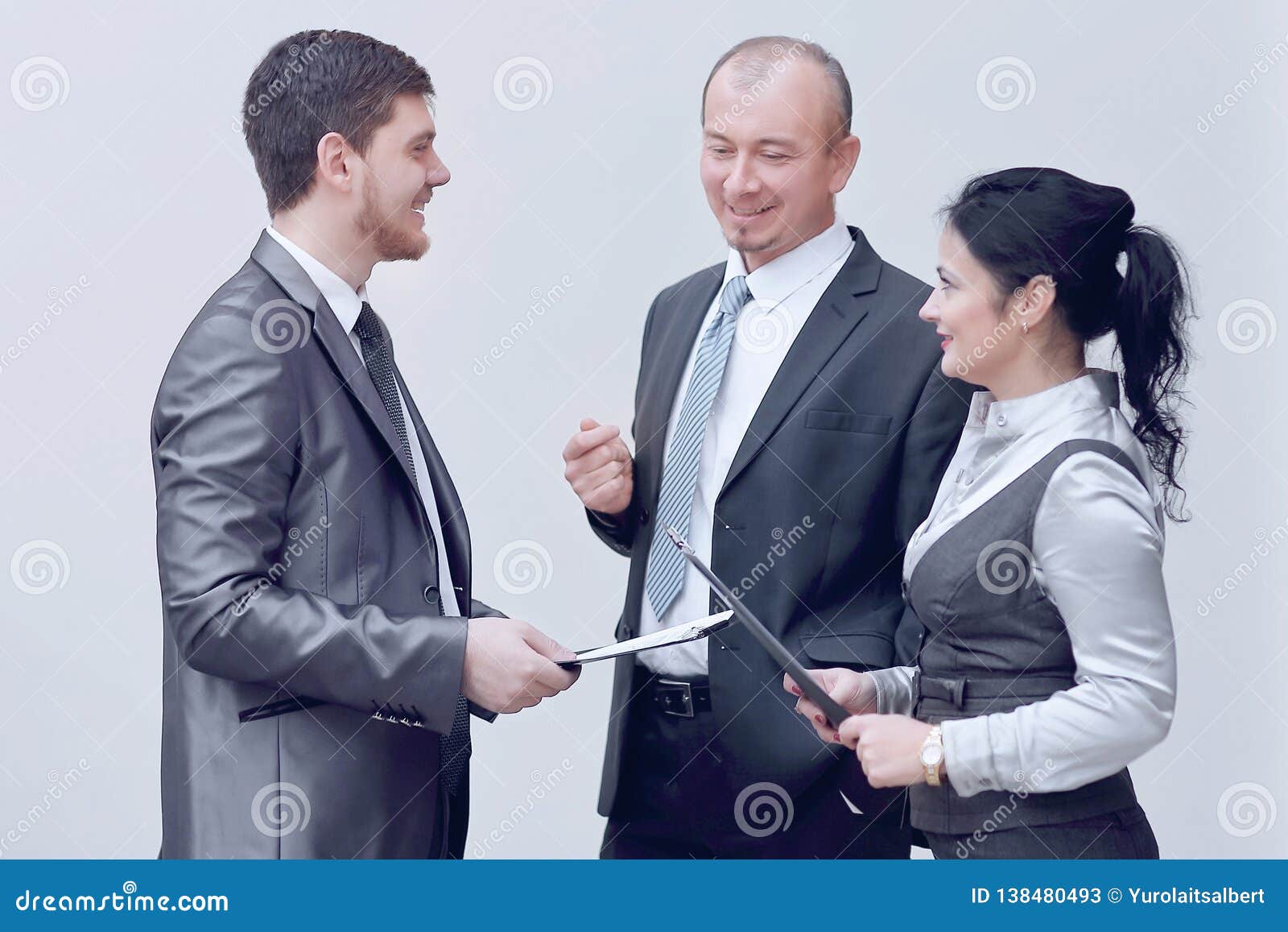 Business People Discussion Over Documents in Empty Office Stock Image ...