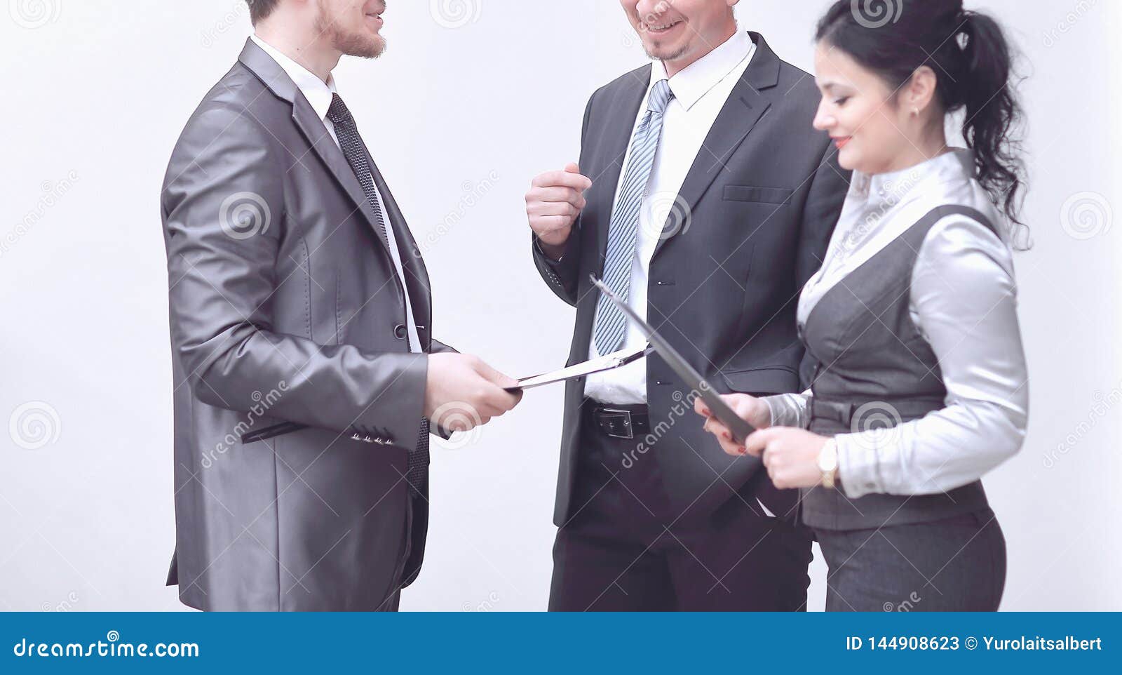 Business People Discussion Over Documents in Empty Office Stock Image ...
