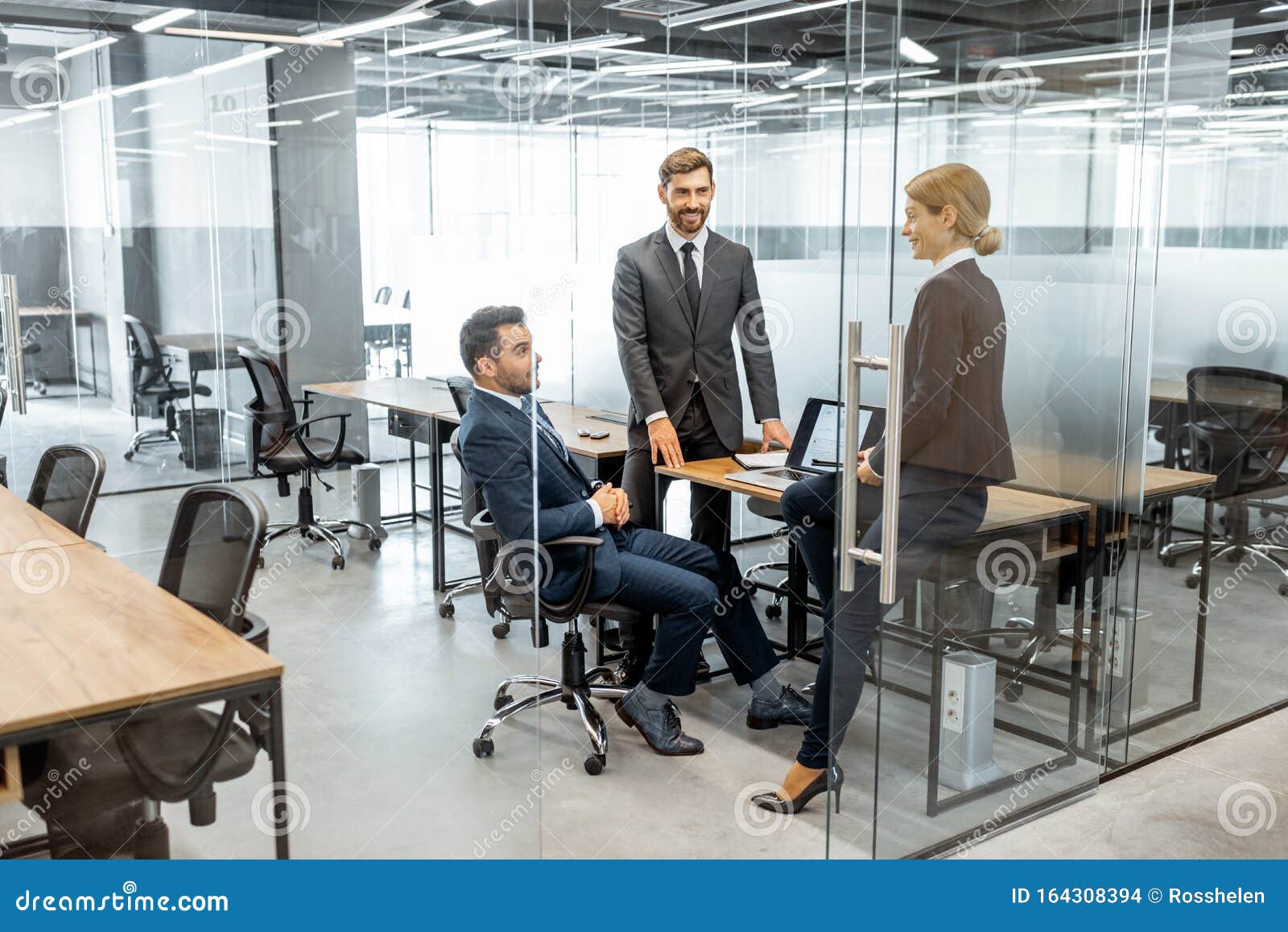 Business People during a Discussion at the Working Place Stock Photo ...