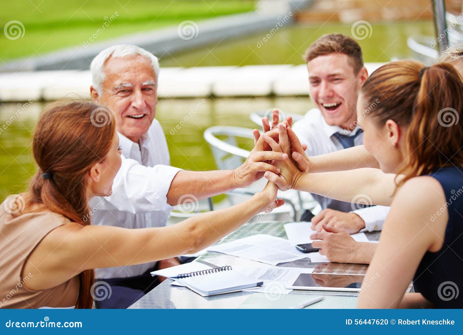 Business People Doing High Five in a Meeting Stock Photo - Image of ...