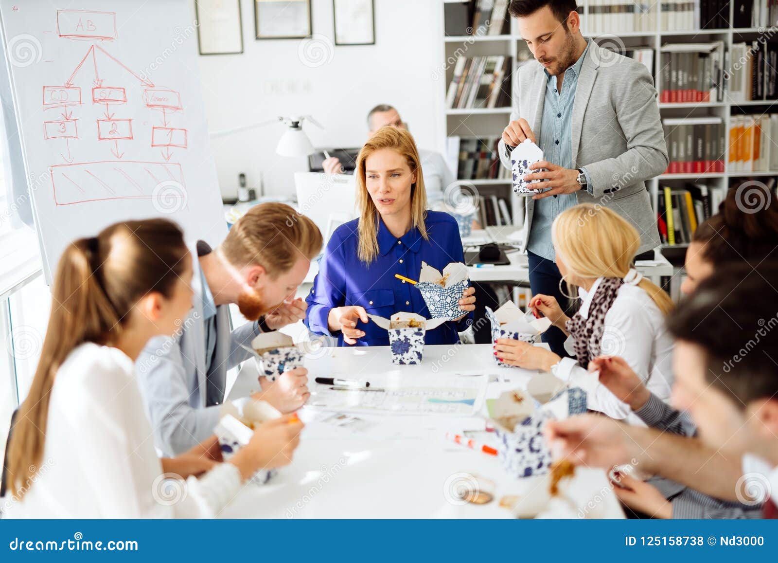 Business People Eating in Office Stock Photo - Image of people, sitting ...