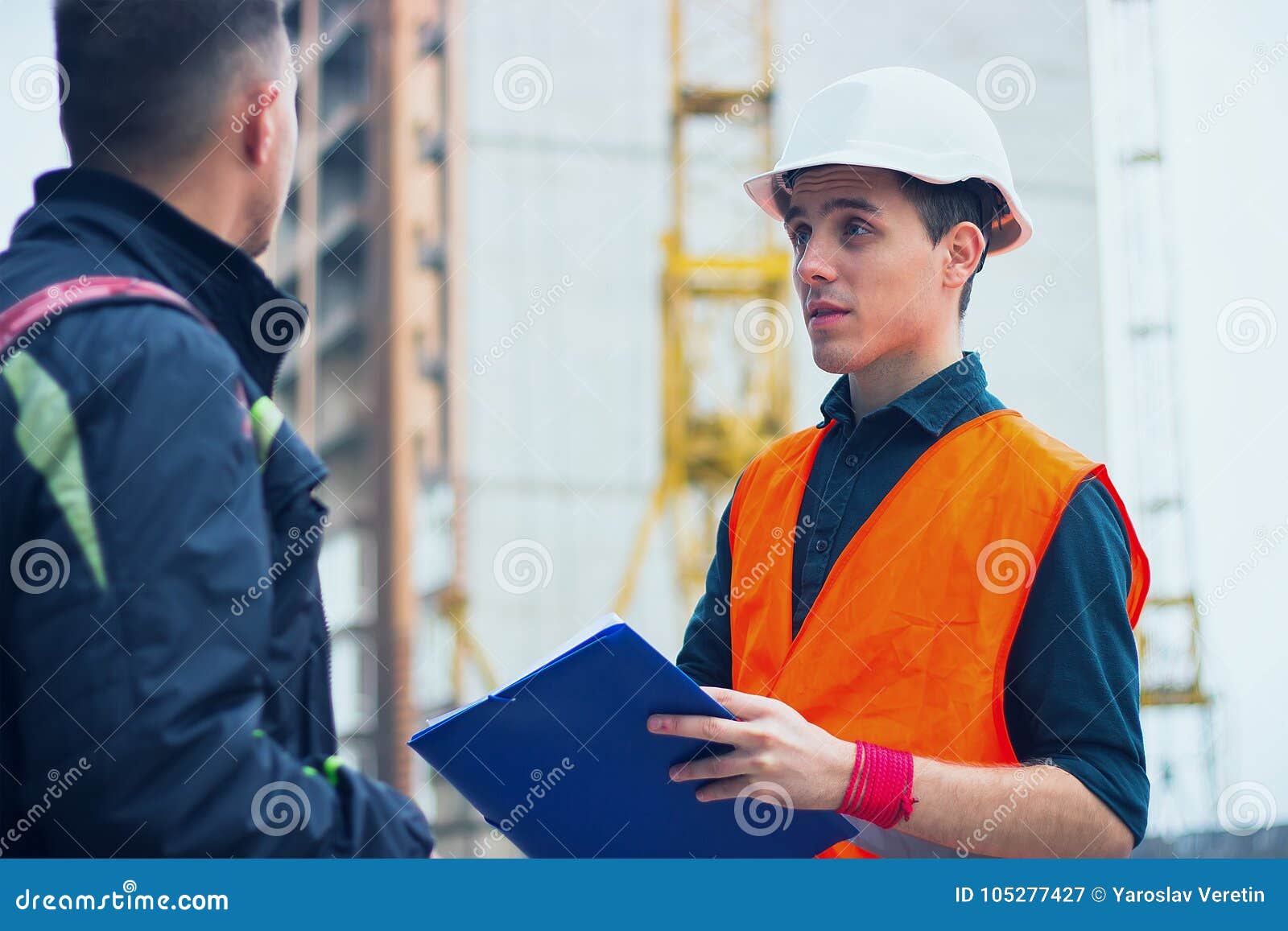 Engineer Talking Discussing with Architect Working with Blueprints for ...