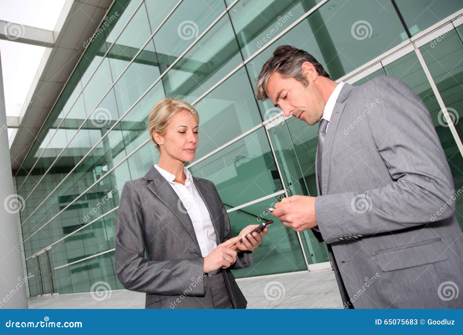 Business People Exchanging Contact Numbers Stock Image - Image of ...