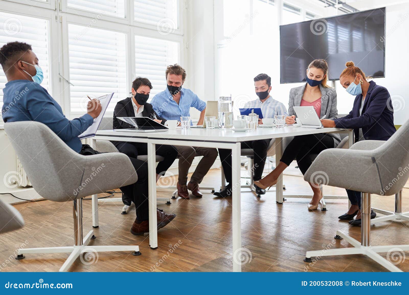 Business People with Face Mask in the Workshop Stock Photo - Image of ...