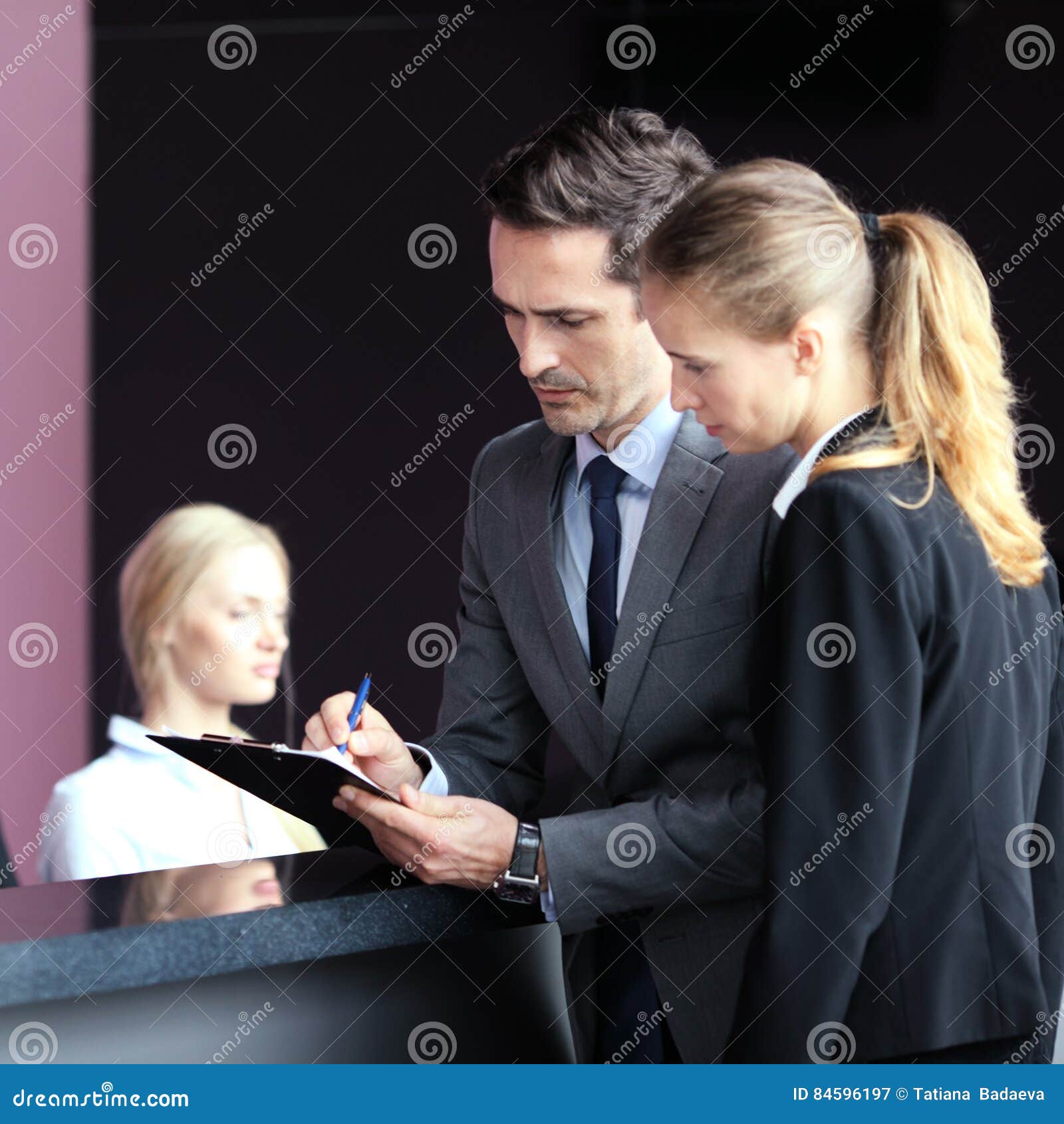 Business People Filling Forms Stock Image - Image of receptionist, desk ...