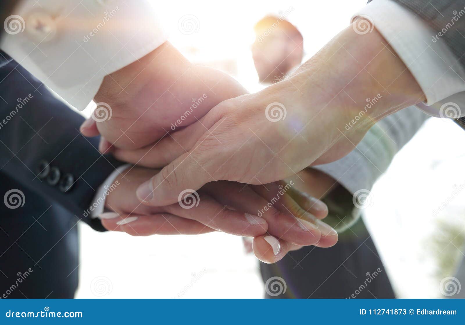 Business People Folding Their Hands Together. Stock Image - Image of ...