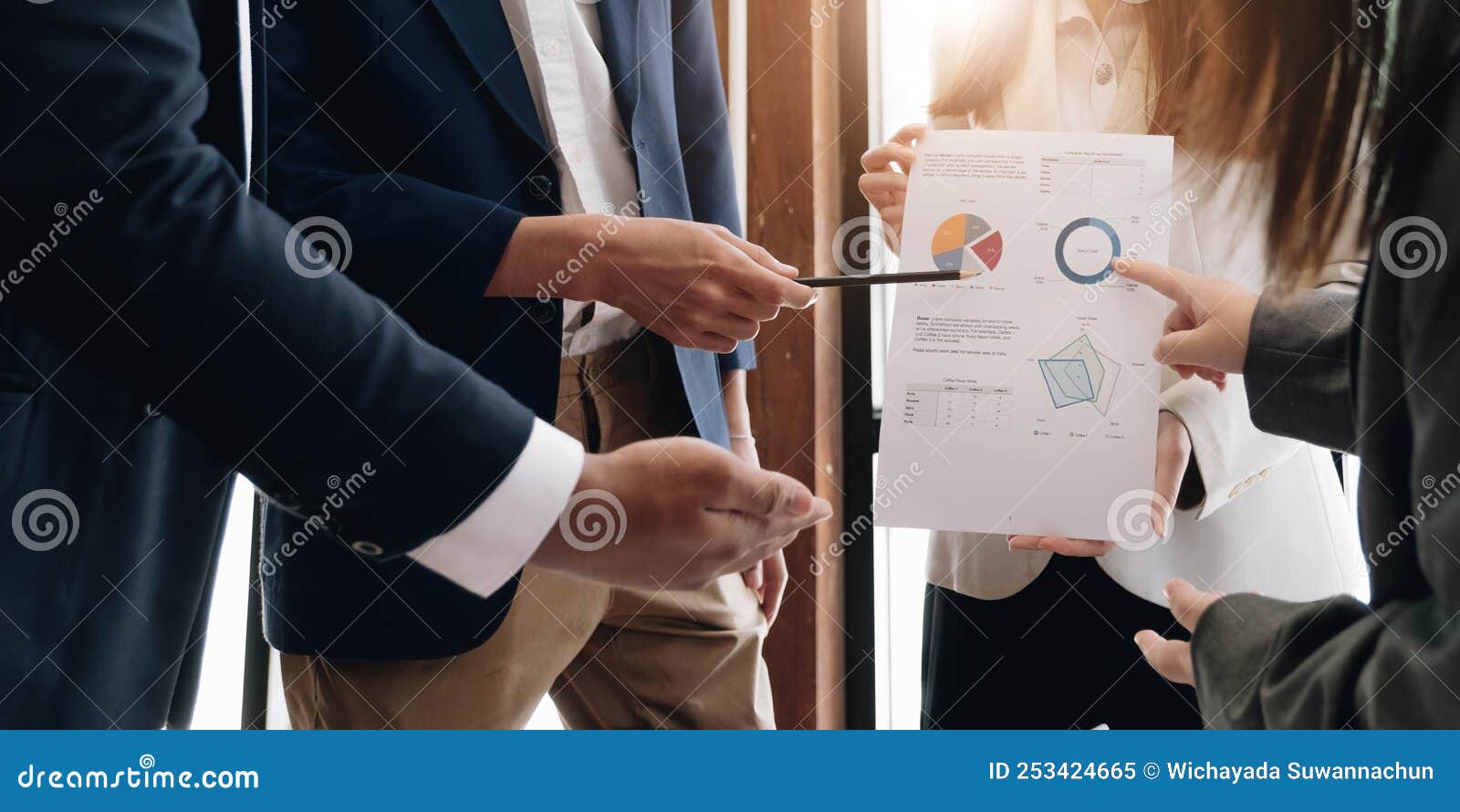 Business People Hand Pointing at Business Document during Discussion at ...