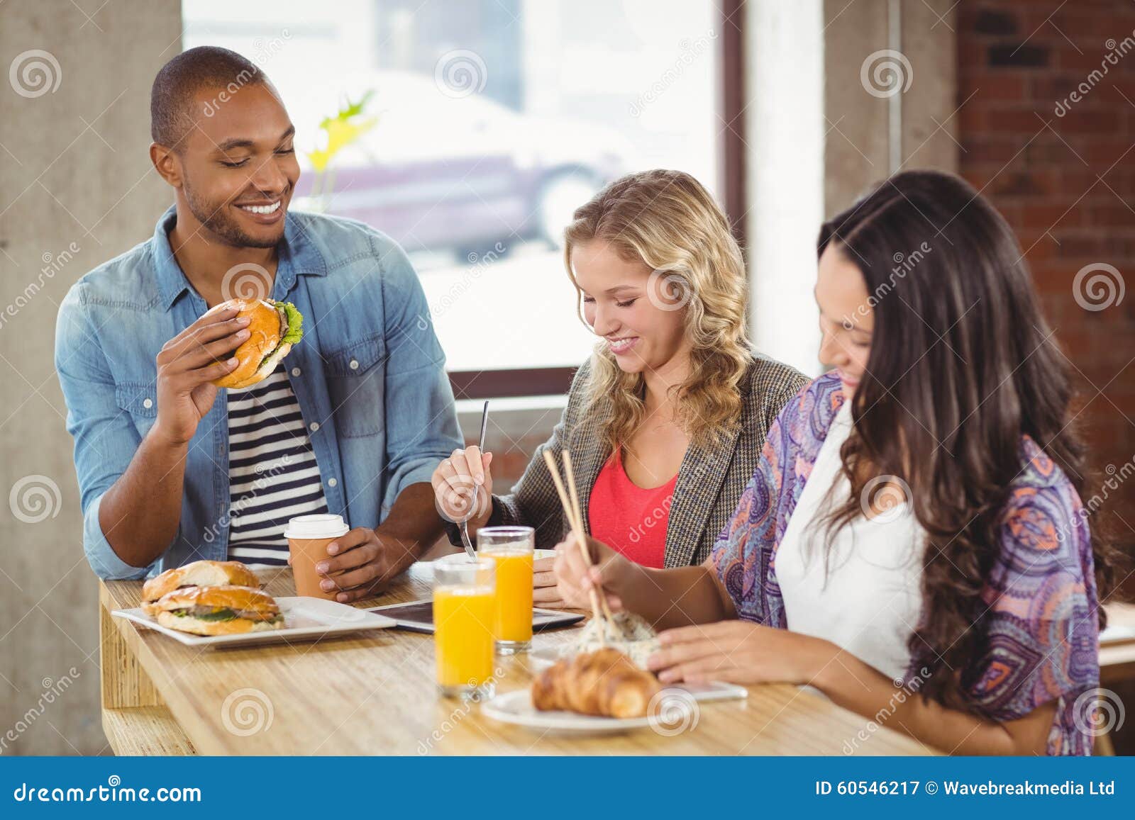Business People Having Breakfast in Office Stock Image - Image of ...