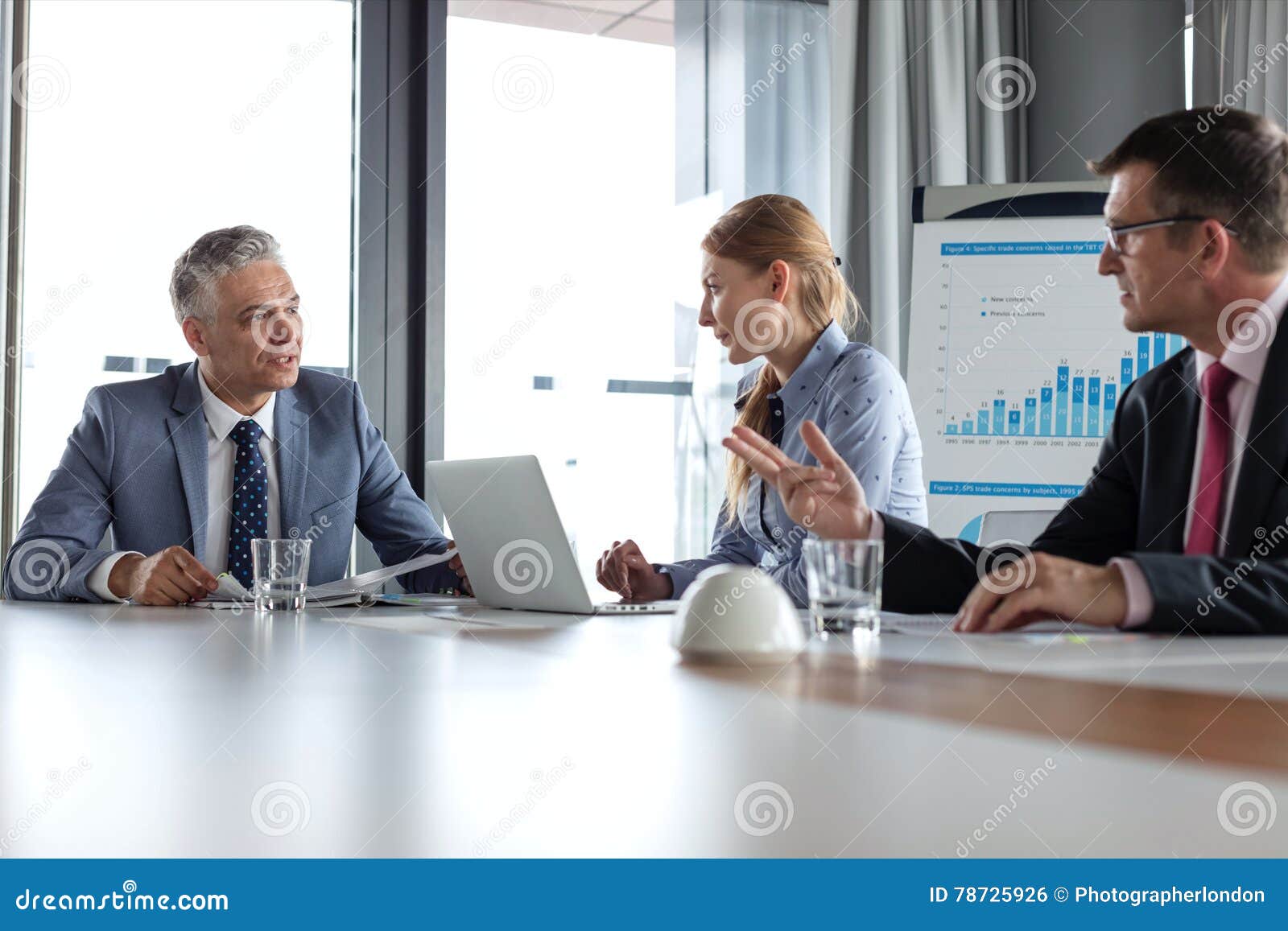 Business People Having Discussion at Table in Board Room Stock Photo ... Business People Having Discussion at Table in Board Room Stock Photo ...