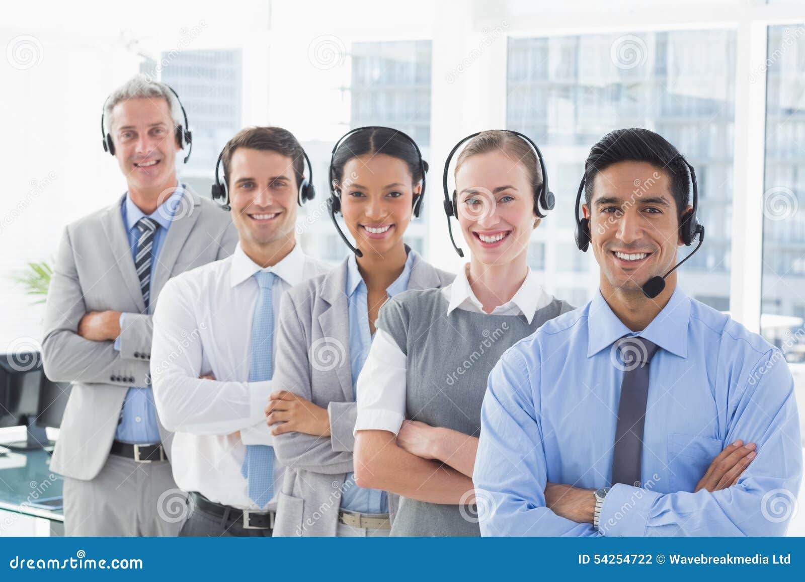 Business People with Headsets Smiling at Camera Stock Photo - Image of ...
