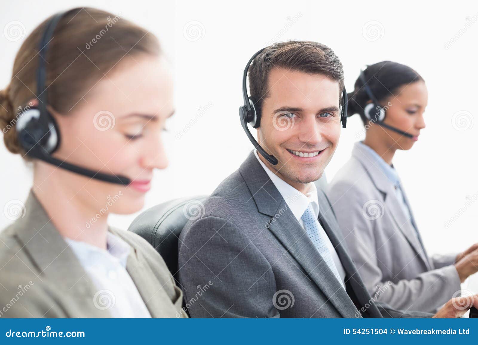 Business People with Headsets Using Computers Stock Photo - Image of ...