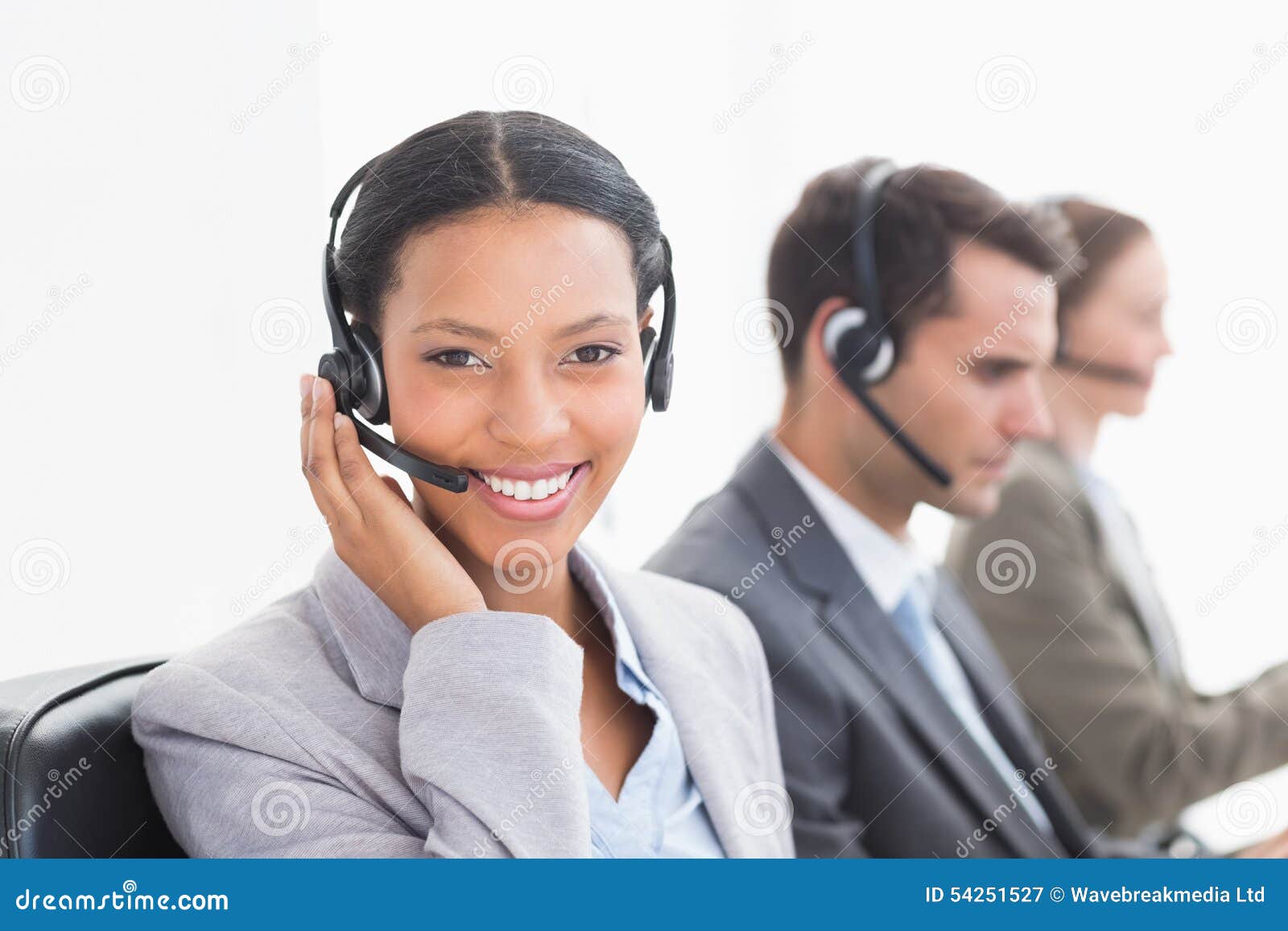 Business People with Headsets Using Computers Stock Image - Image of ...