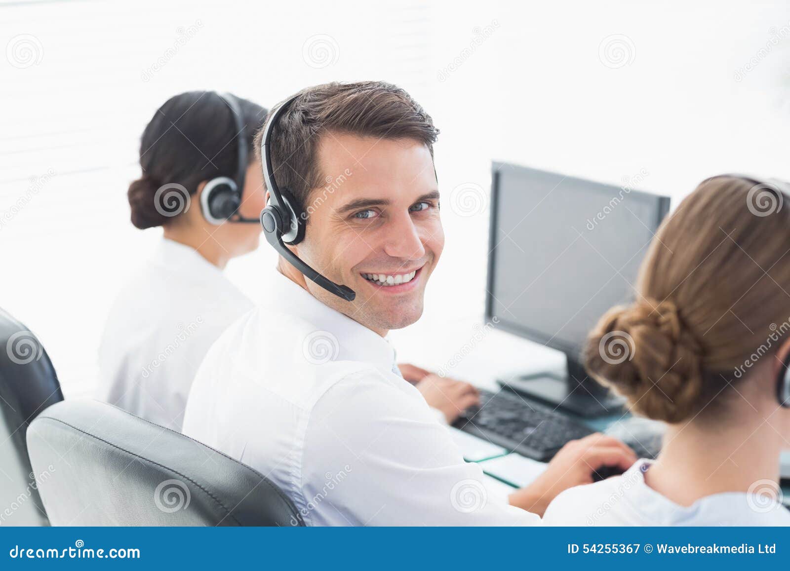 Business People with Headsets Using Computers Stock Image - Image of ...