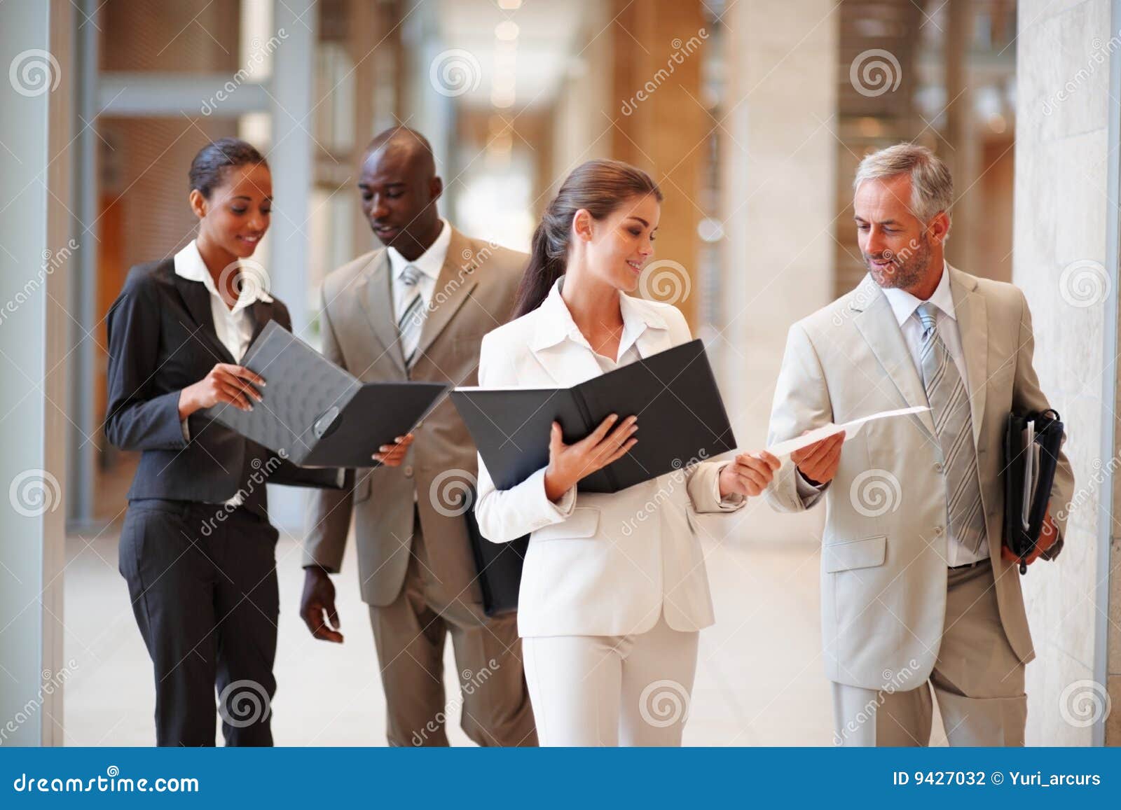 Business People Holding Files at the Hallway Stock Photo - Image of ...