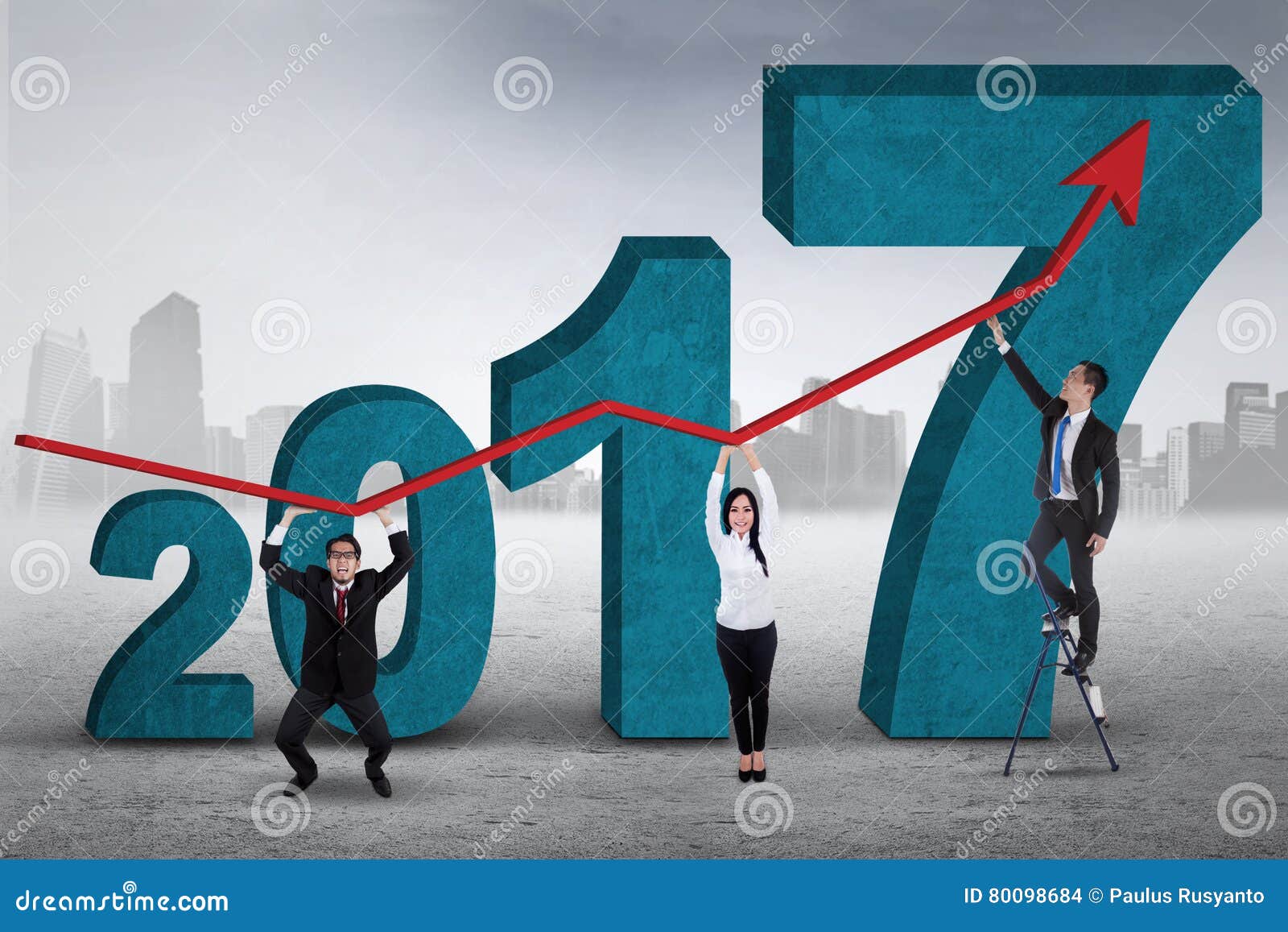 Business People Holding Graph with Numbers 2017 Stock Photo - Image of ...