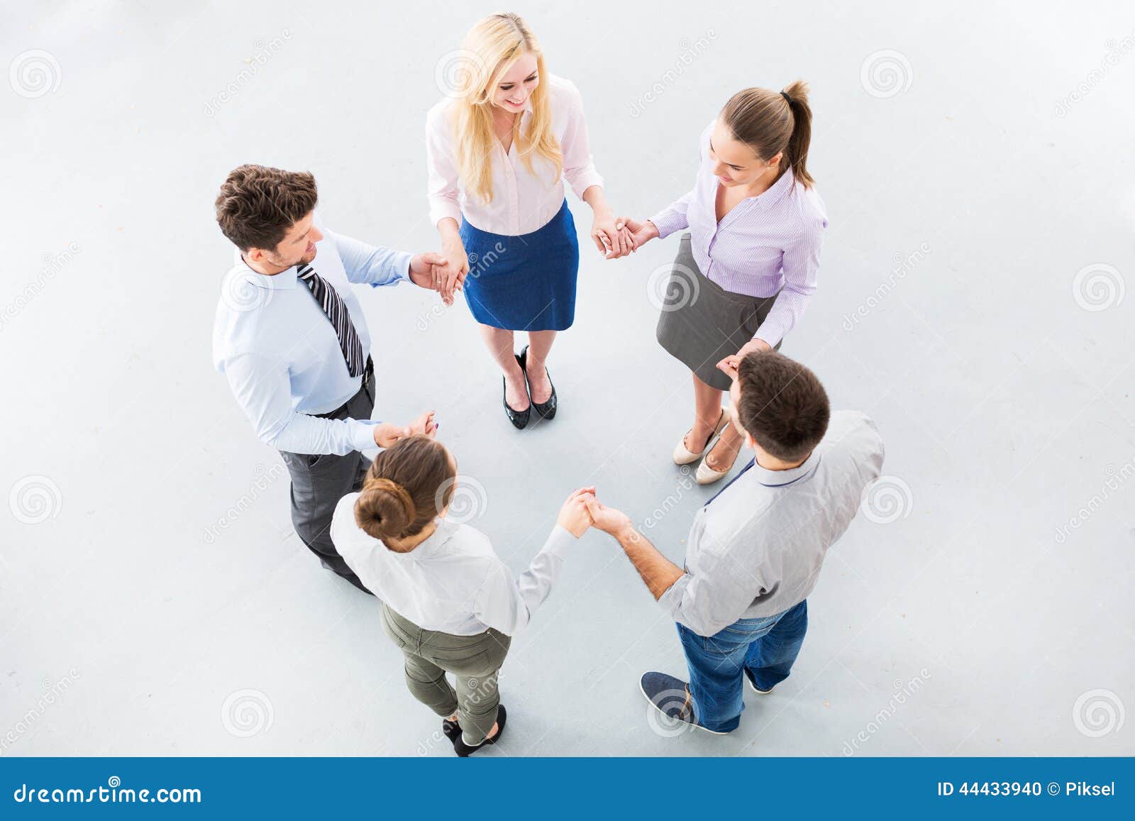 Business People Holding Hands To Form a Circle Stock Photo - Image of ...