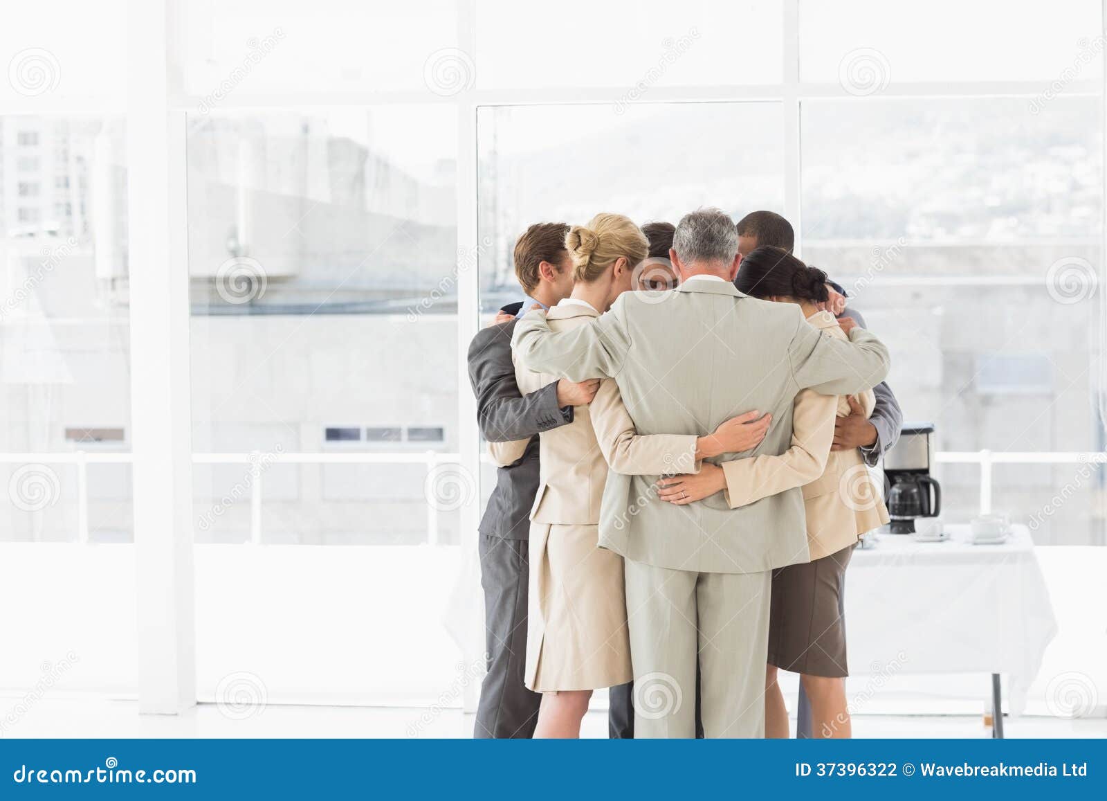 Business People Hugging in a Circle Stock Photo - Image of quarter ...