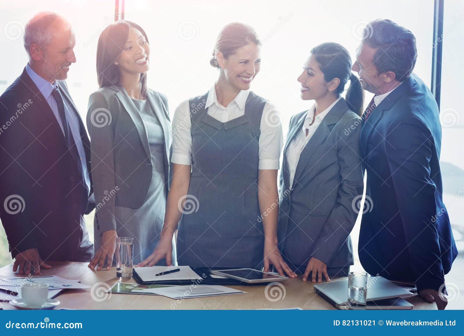 Business People Interacting in Conference Room Stock Image - Image of ...