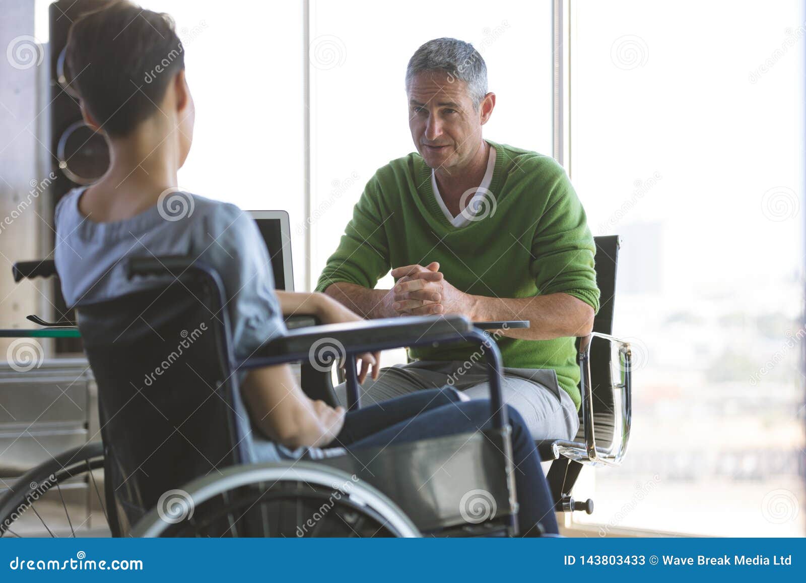Business People Interacting with Each Other at Desk Stock Image - Image ...