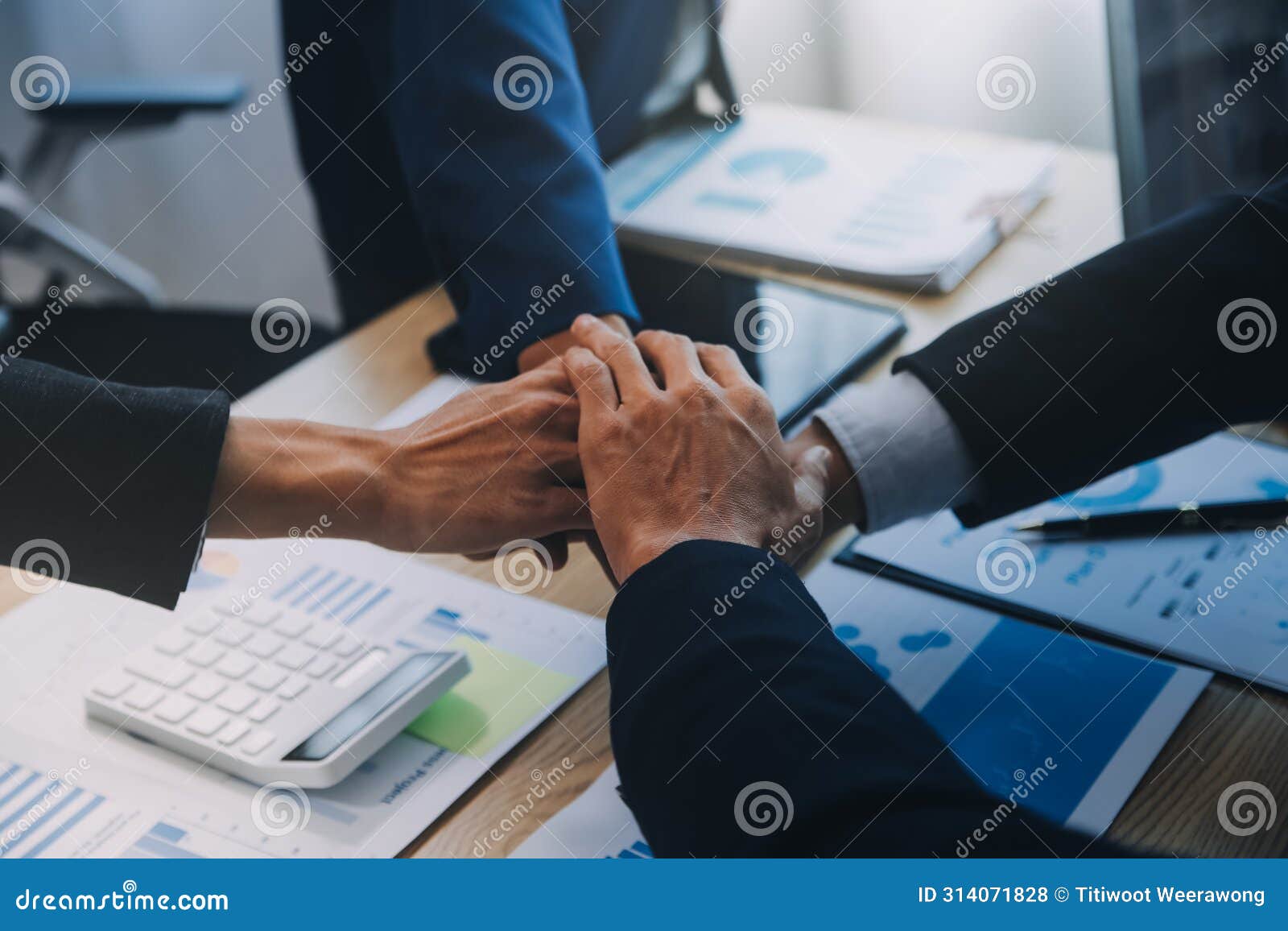 Business People Join Hands To Join Forces As a Teamwork Stock Photo ...